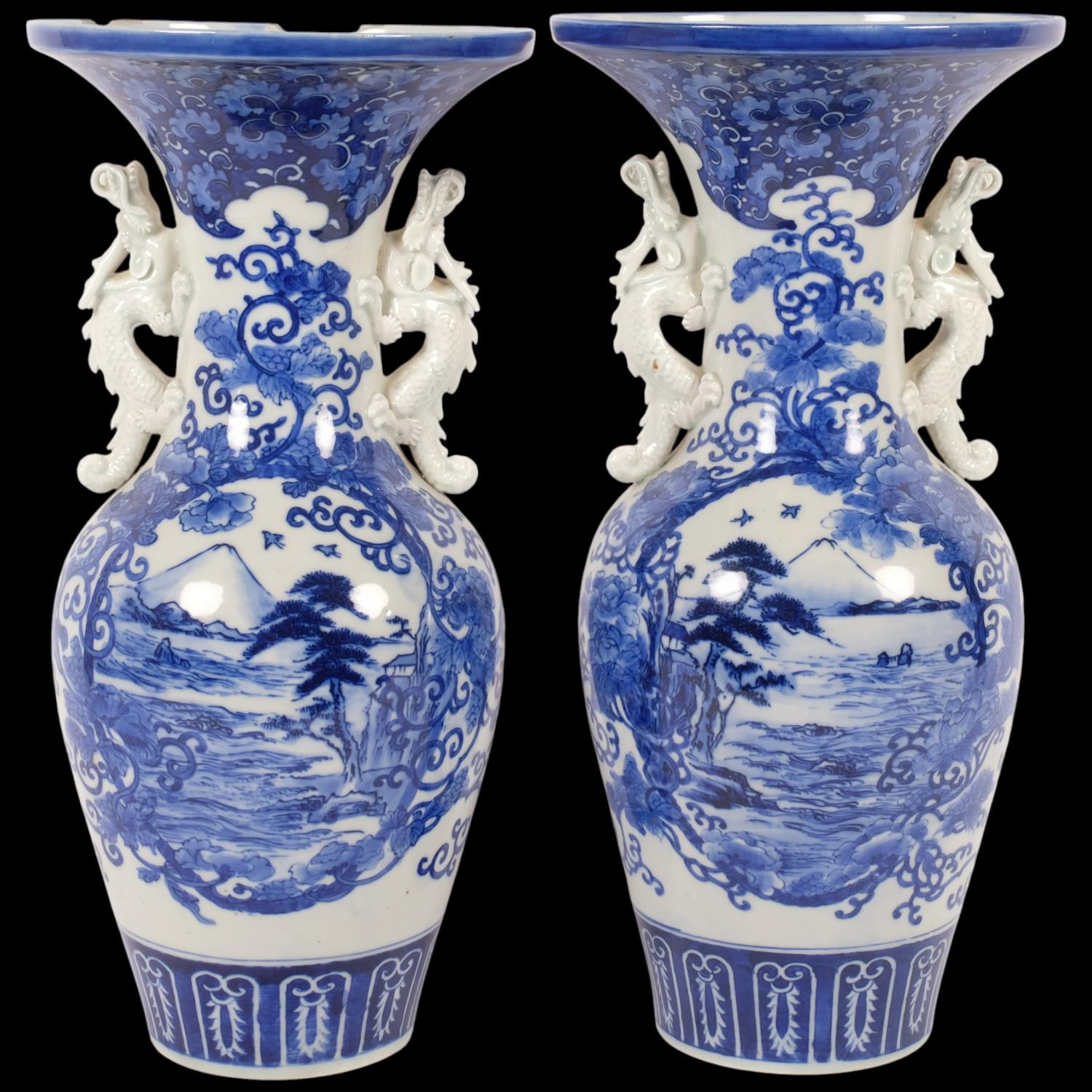 A pair of Chinese blue and white baluster vases, with blanc de chine ...