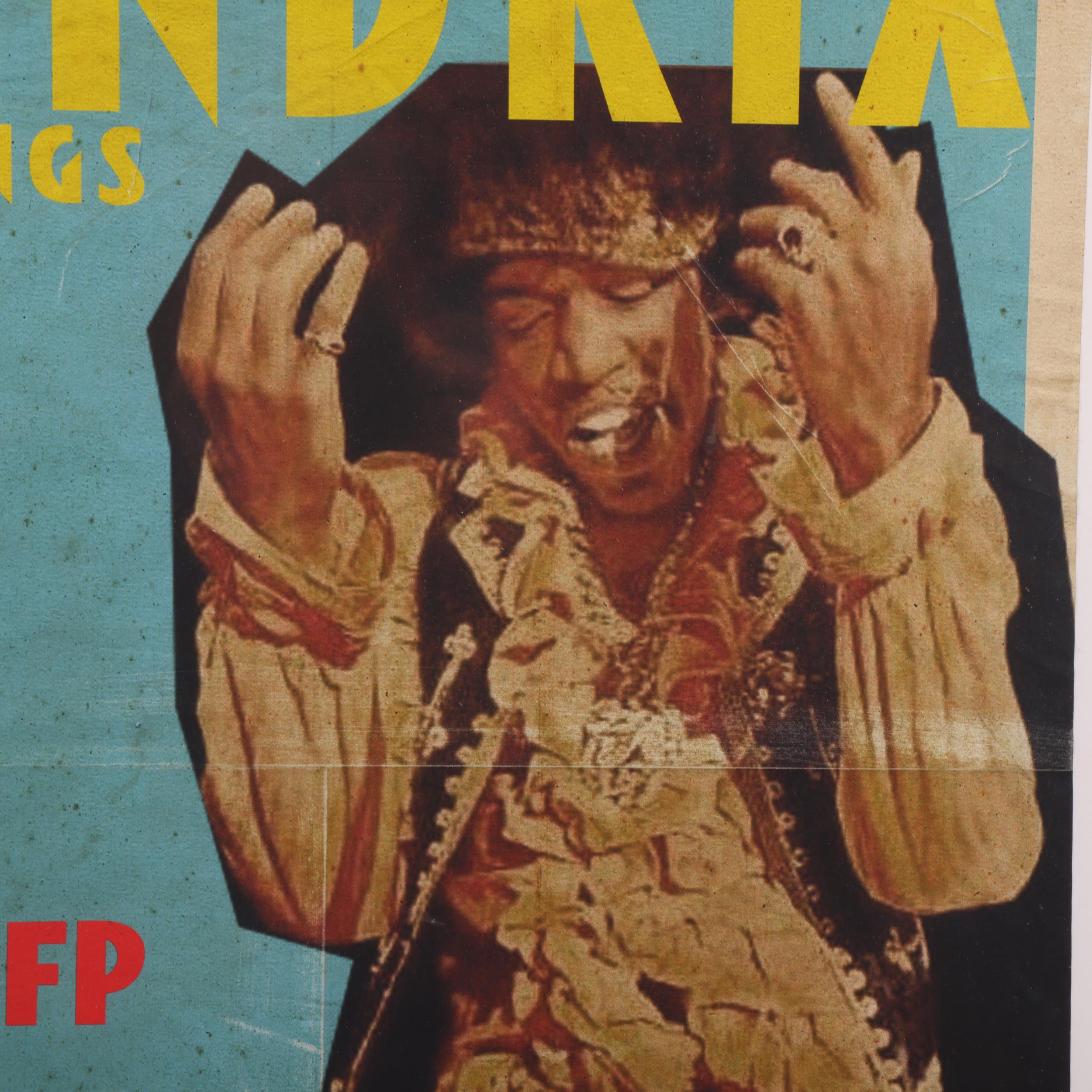 A Jimi Hendrix poster of Hendrix over the fire on Hastings Pier "BTMFP ...