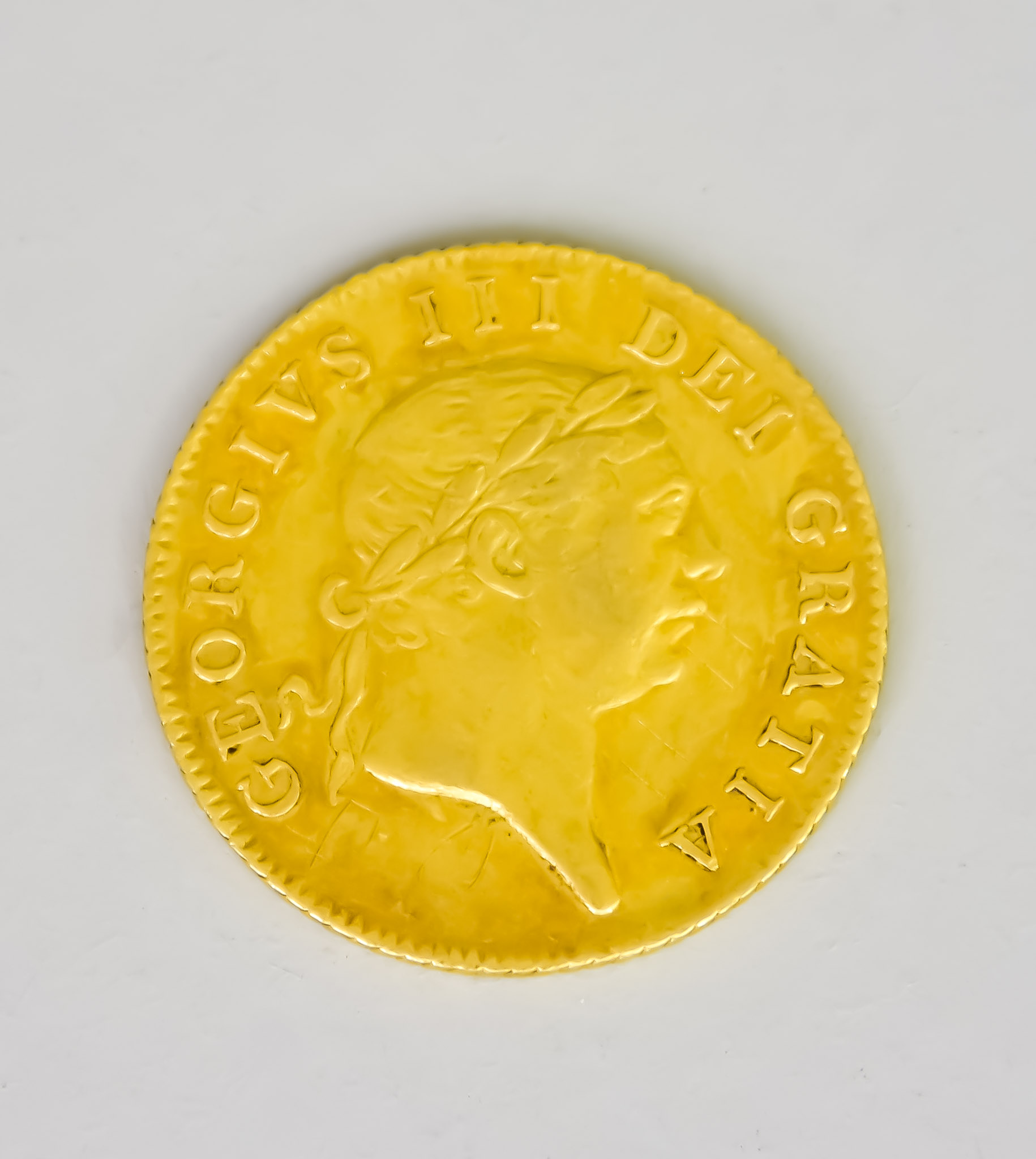 A George III Gold 'Military' Guinea, 1813, 8.36g, very fine/extremely ...