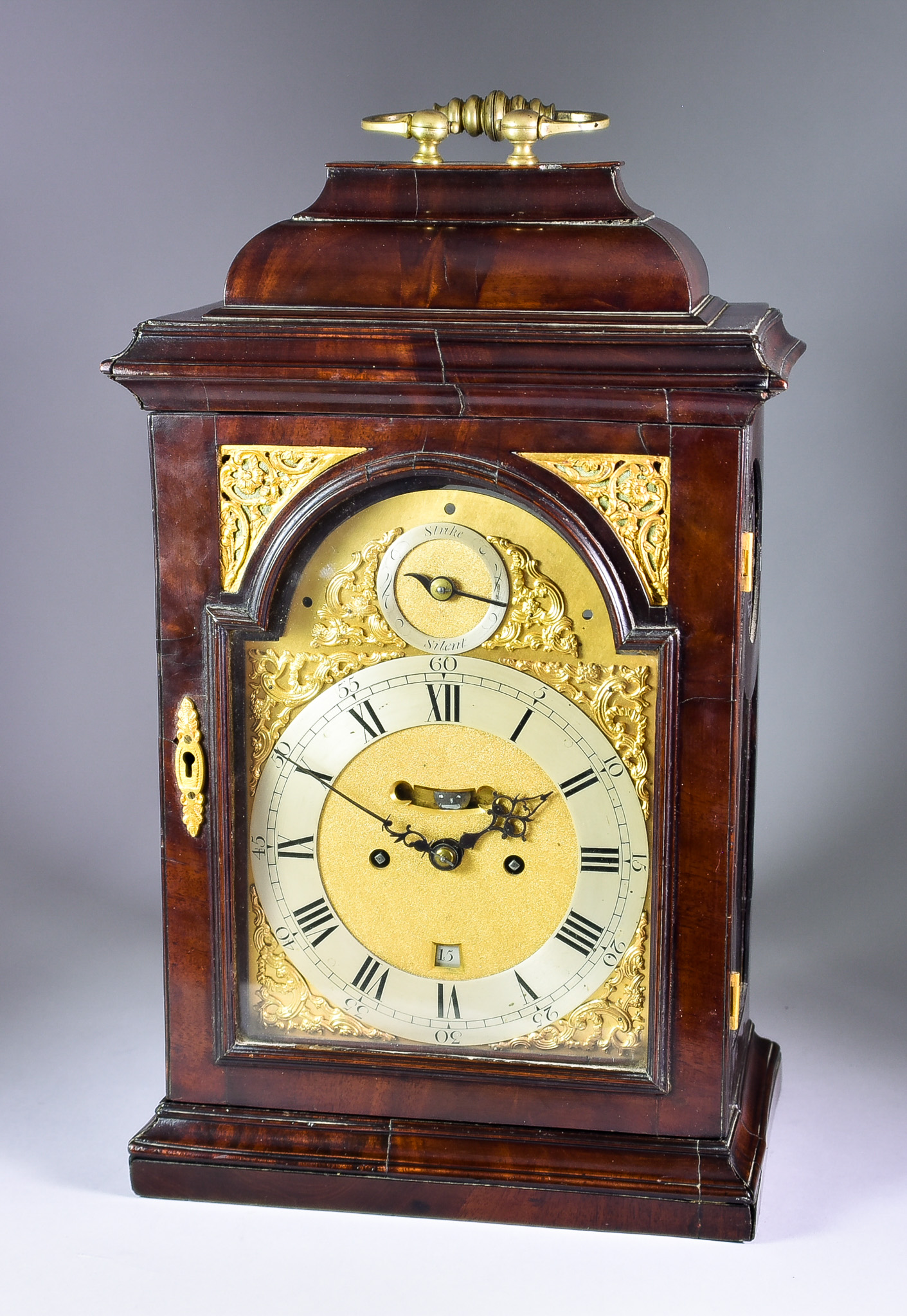 A George III Mahogany Bracket Clock, the 7ins arched brass dial with ...