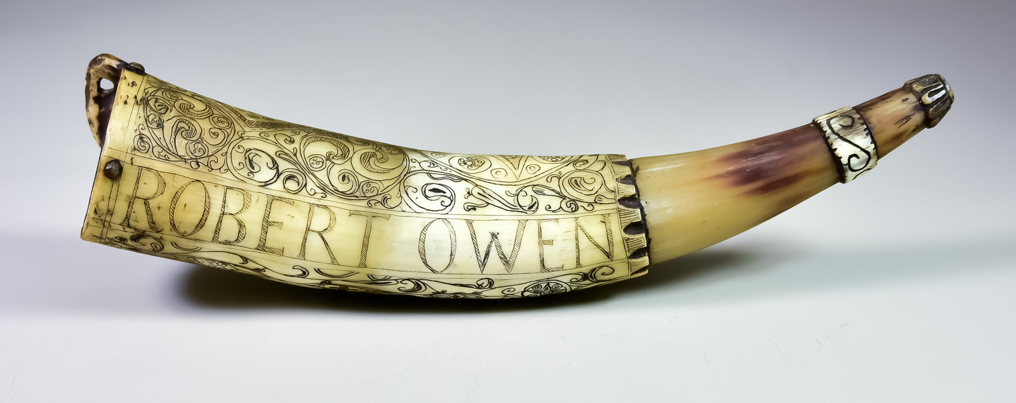 A 17th/ 18th Century Horn Powder Flask, engraved with stylised motifs ...