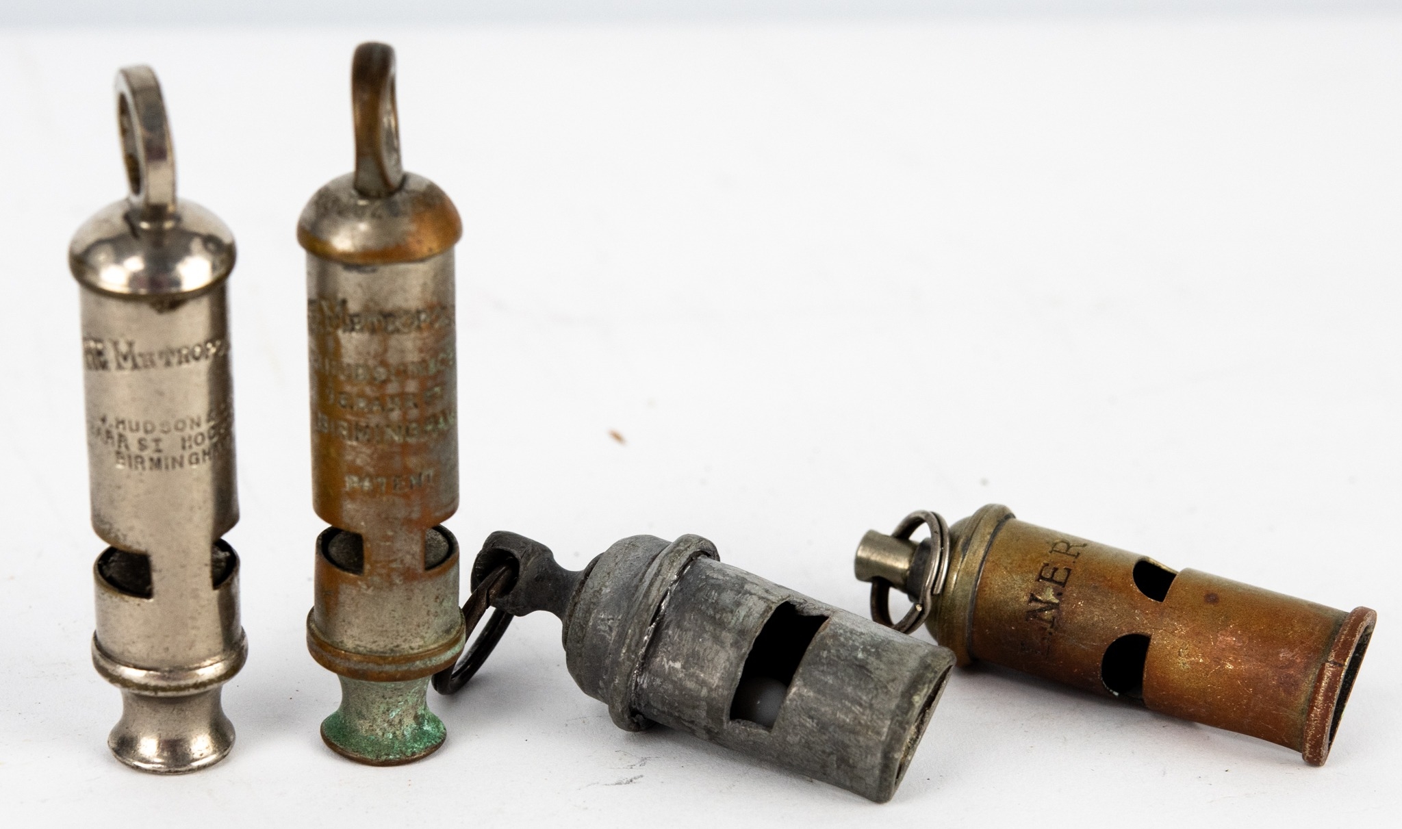 CHUNKY CAST PEWTER UNBRANDED VINTAGE WHISTLE WITH A PEA; an LNER PLATED ...