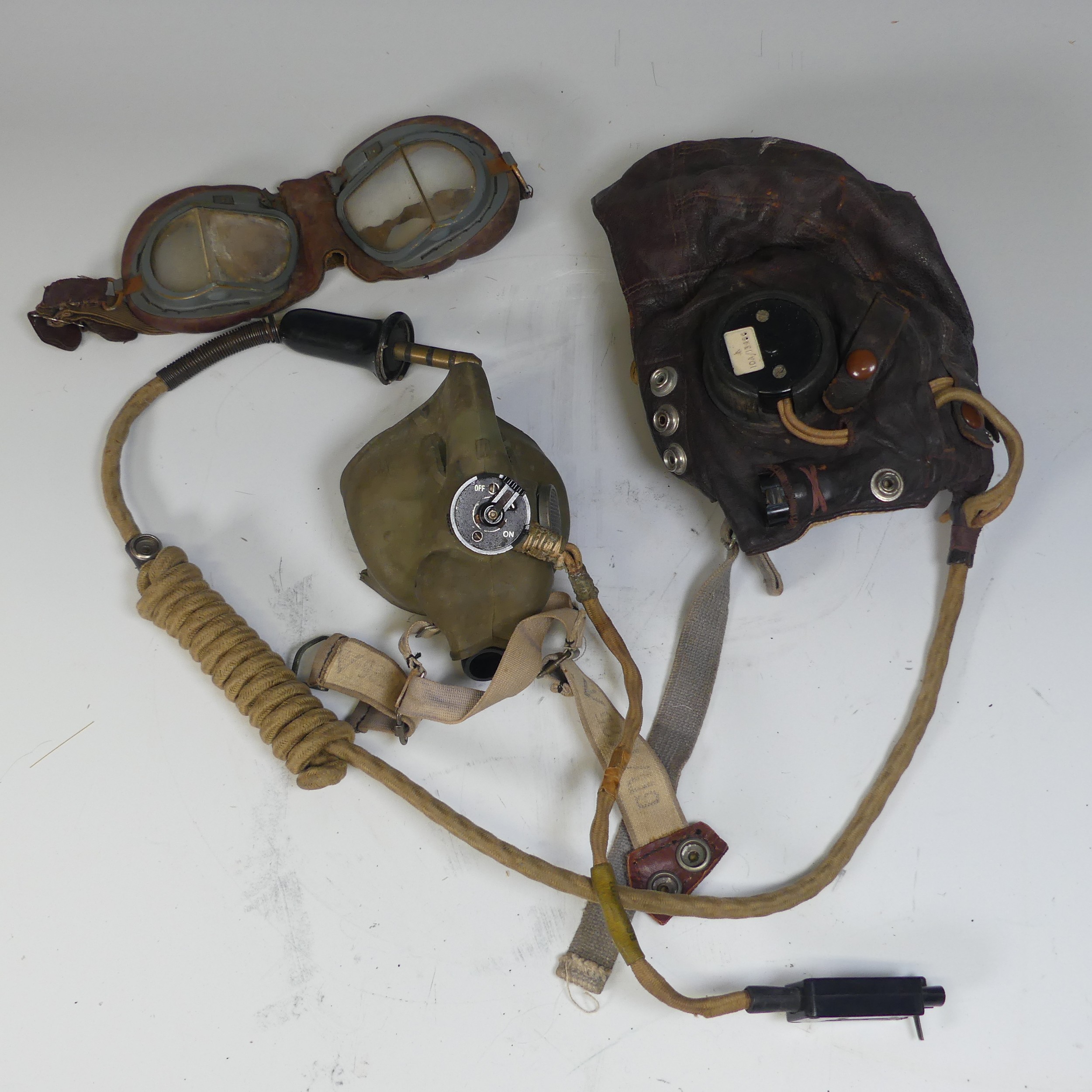 A WW2 RAF C-Type leather Flying Helmet and Mask, stamped with broad ...