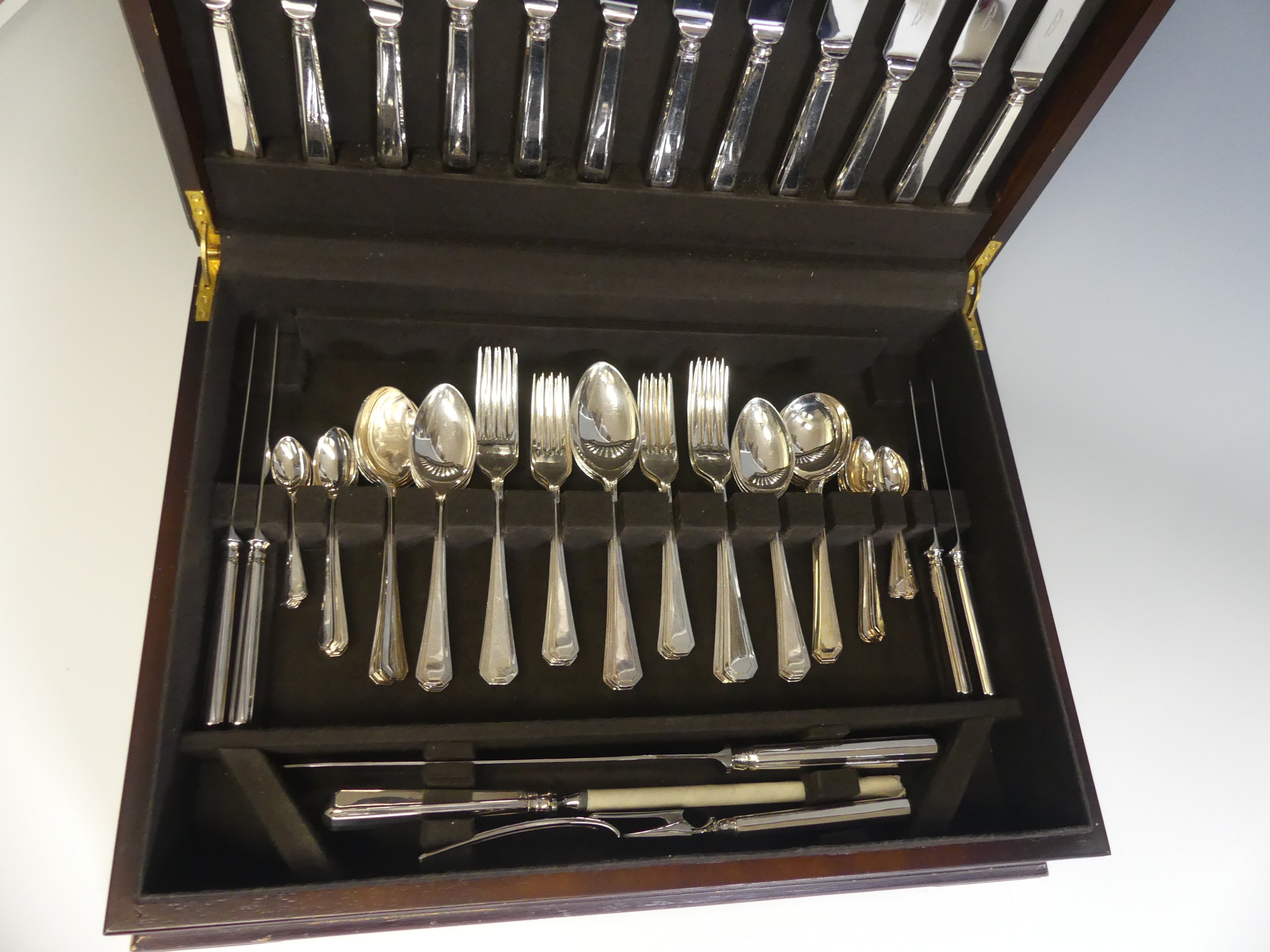 A silver plated Canteen of Cutlery, retailed by Harrods Ltd., eight ...