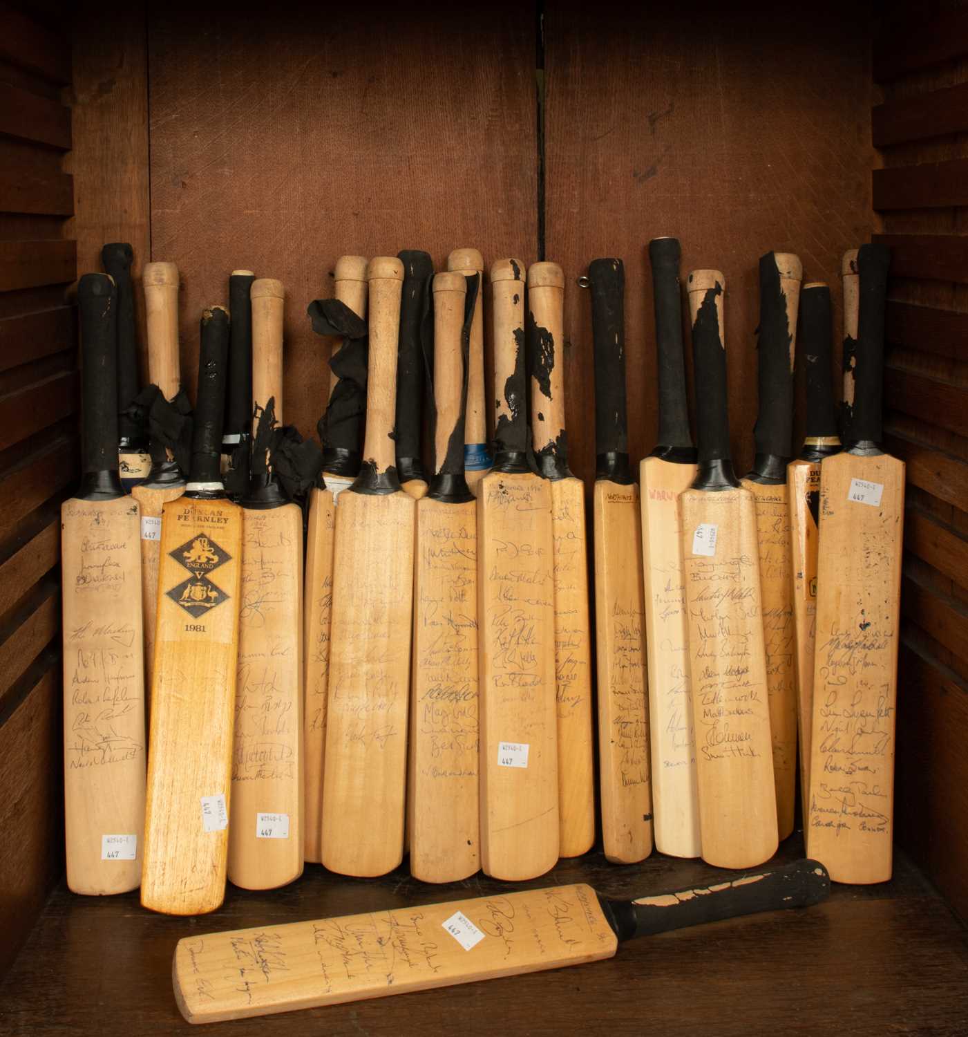 inc A collection of twenty-one signed miniature commemorative cricket ...