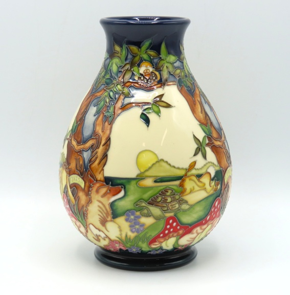 A Moorcroft pottery "Tortoise & Hare" vase signed by Nicola Slaney ...