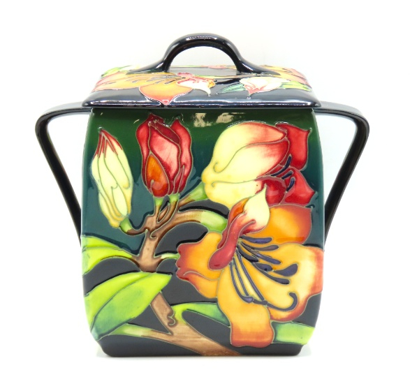 A Moorcroft pottery "Pencarrow" twin handled biscuit barrel signed by ...