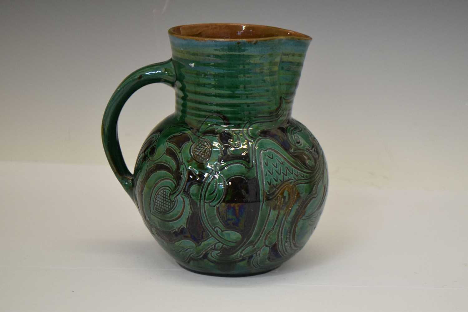 Charles Brannam (Barnstaple) Barum ware pottery jug, ovoid body incised ...