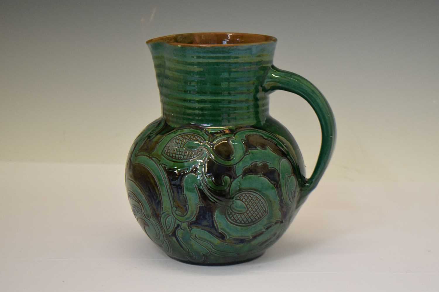 Charles Brannam (Barnstaple) Barum ware pottery jug, ovoid body incised ...
