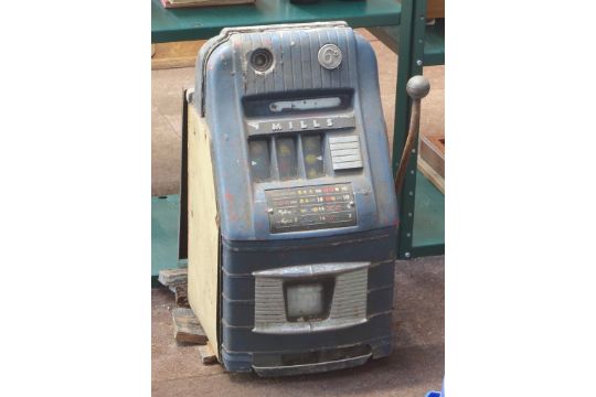 A 1960s Mills 6d one armed bandit Fruit Machine in original blue with ...