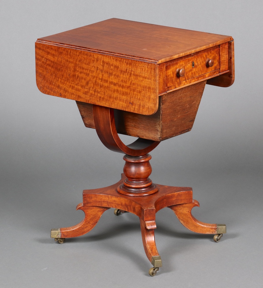 A Victorian mahogany drop flap work table fitted a drawer and deep ...
