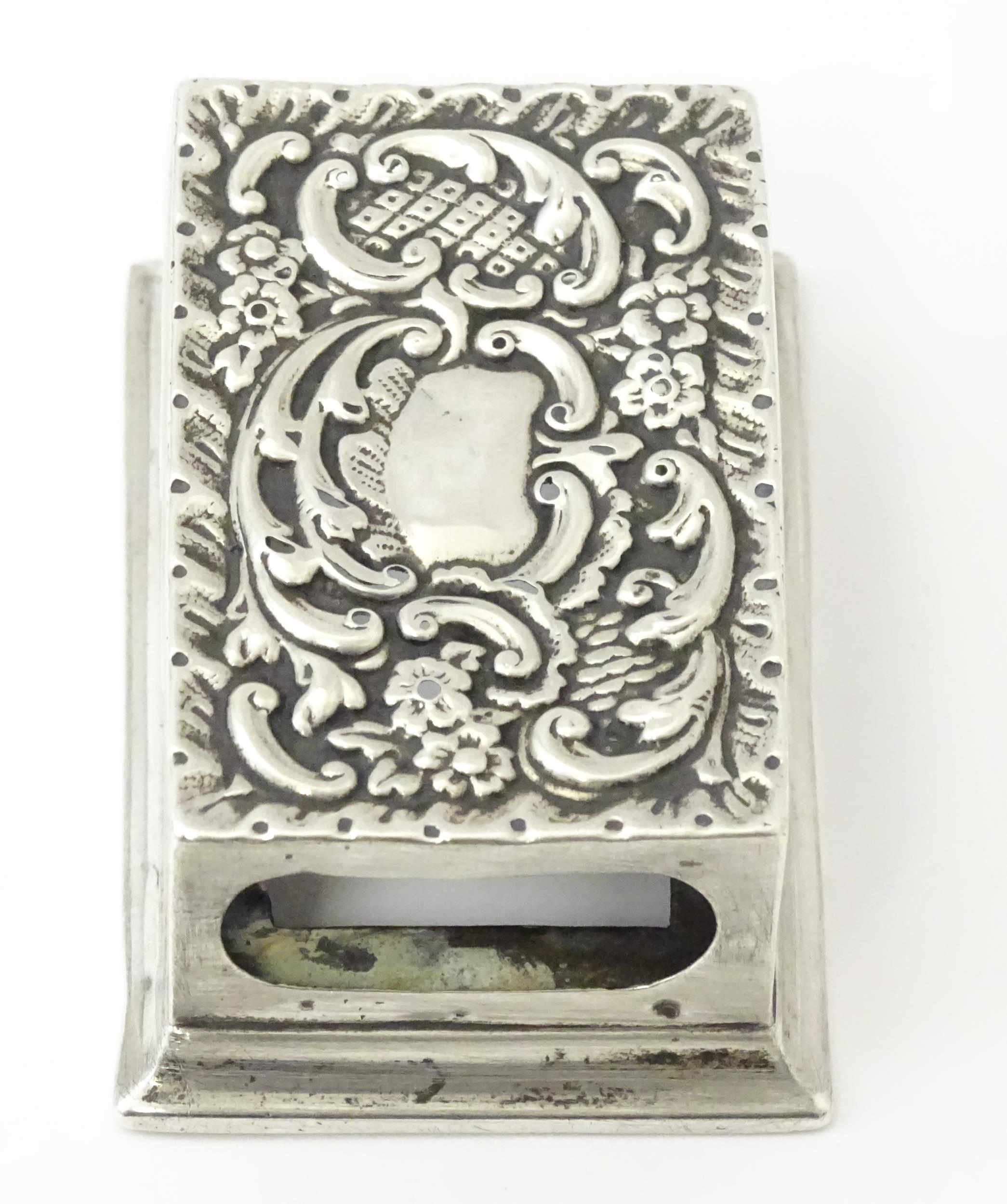 A silver matchbox sleeve / cover with embossed decoration hallmarked ...