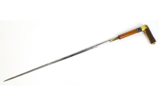 A 19thC Wilkinson Sword Co sword stick with turned beech shank, antler ...