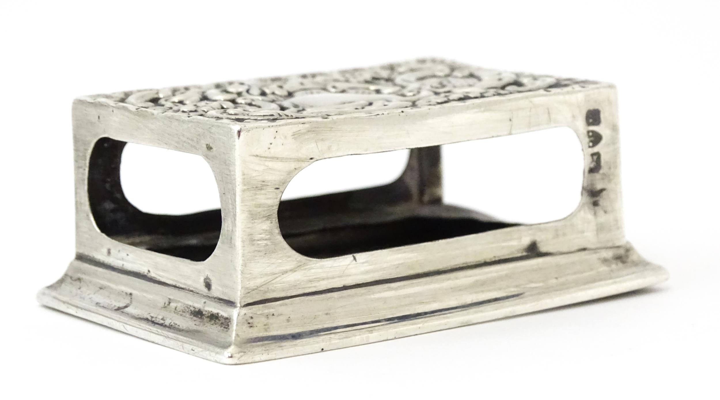 A silver matchbox sleeve / cover with embossed decoration hallmarked ...