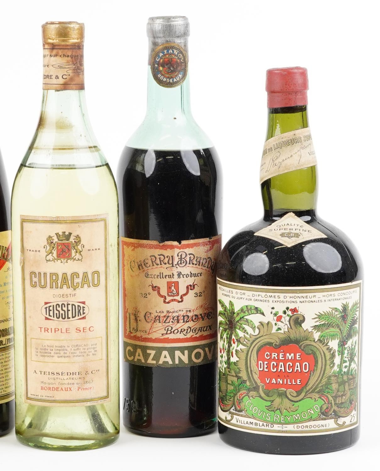 Seven bottles of alcohol including Curaçao Triple Sec, Cazanove cherry ...