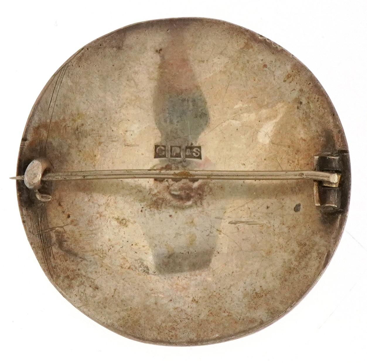 George Panton & Son, a Scottish circular silver brooch embossed with a ...