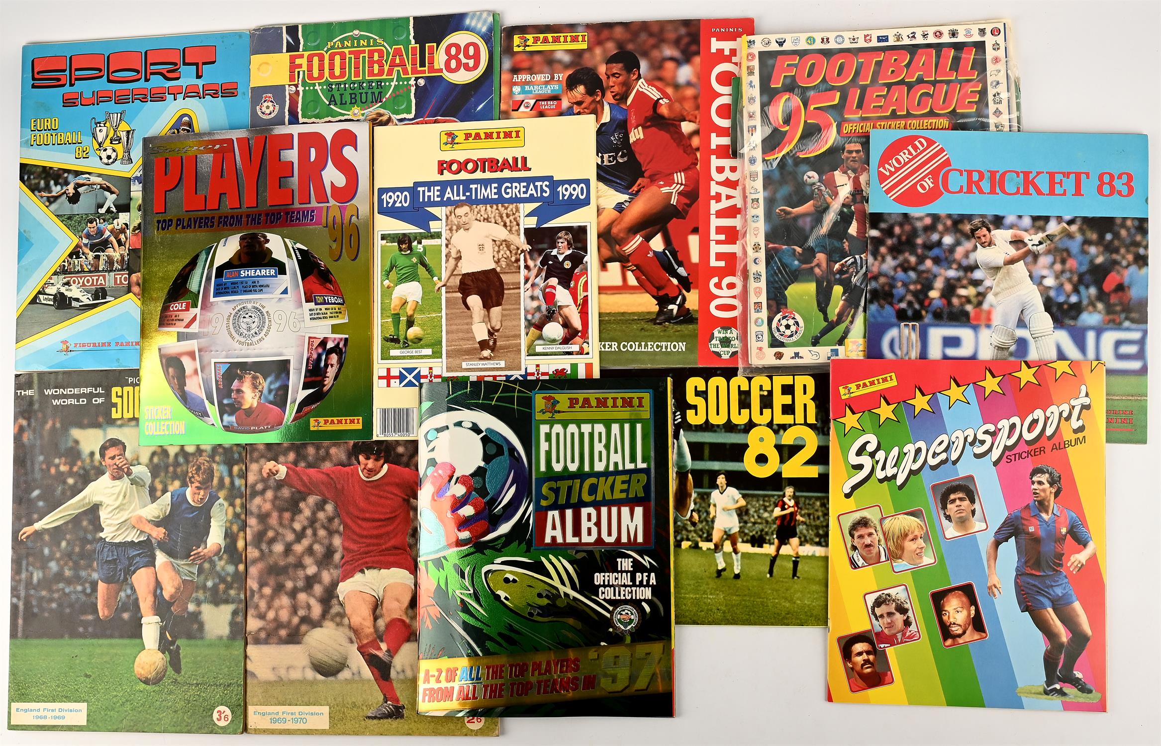 An assortment of 12 miscellaneous complete football/sports sticker ...