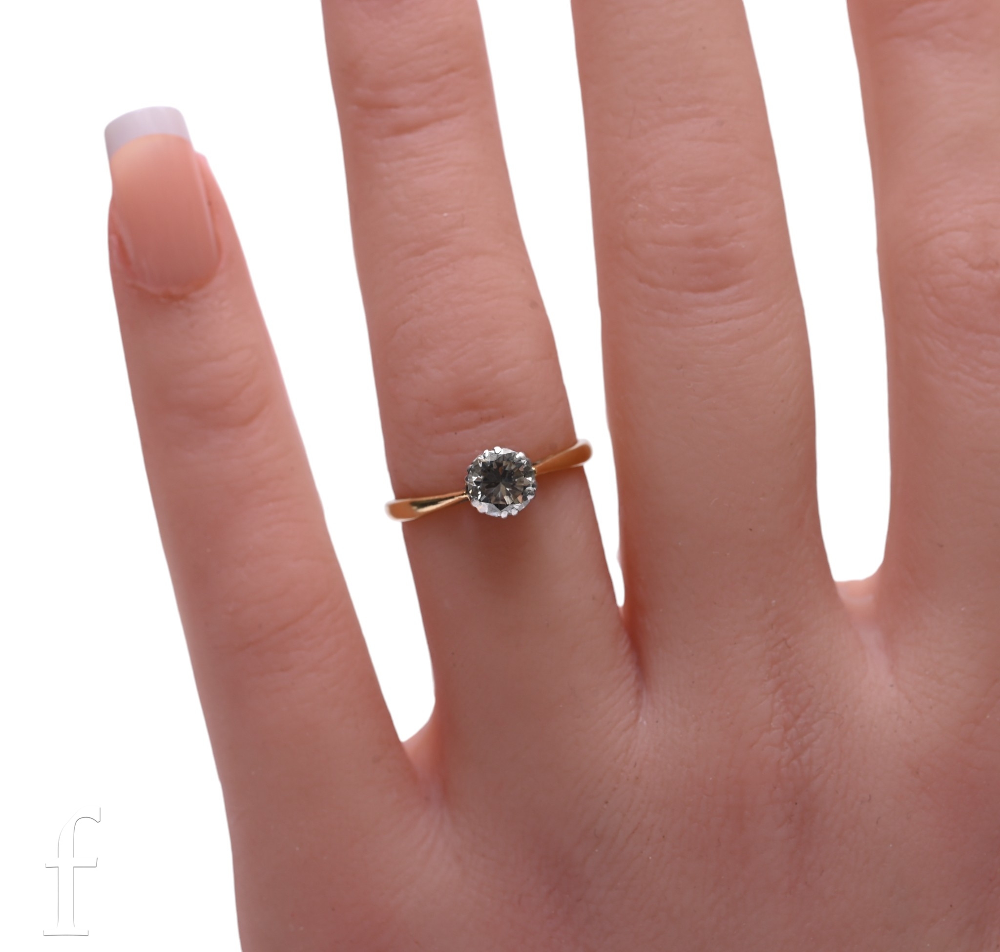 A diamond solitaire ring, on an unmarked band, approx. 0.50cts, total ...