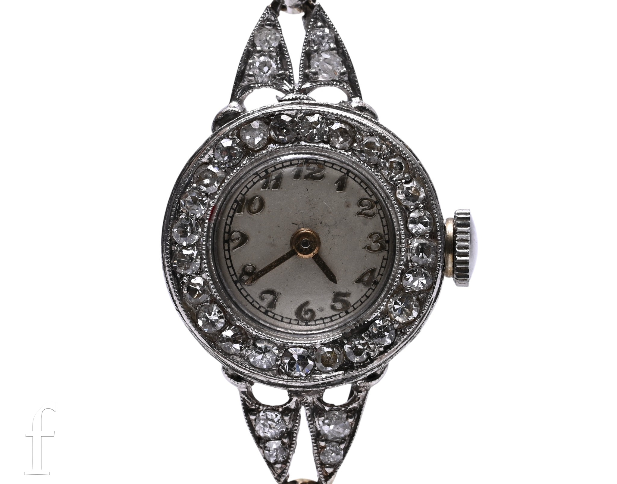 A 1950s lady's white metal and diamond set cocktail watch, the circular ...