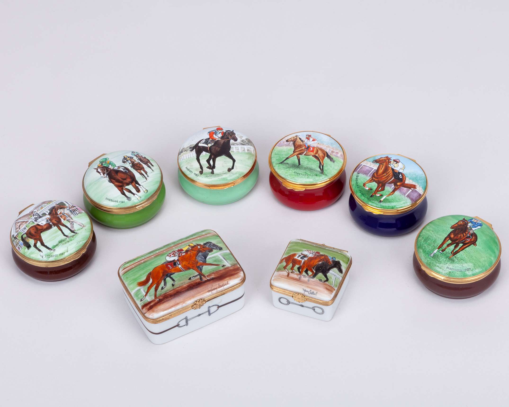 Group of eight enamel boxes featuring racehorses,from the Gilbey ...