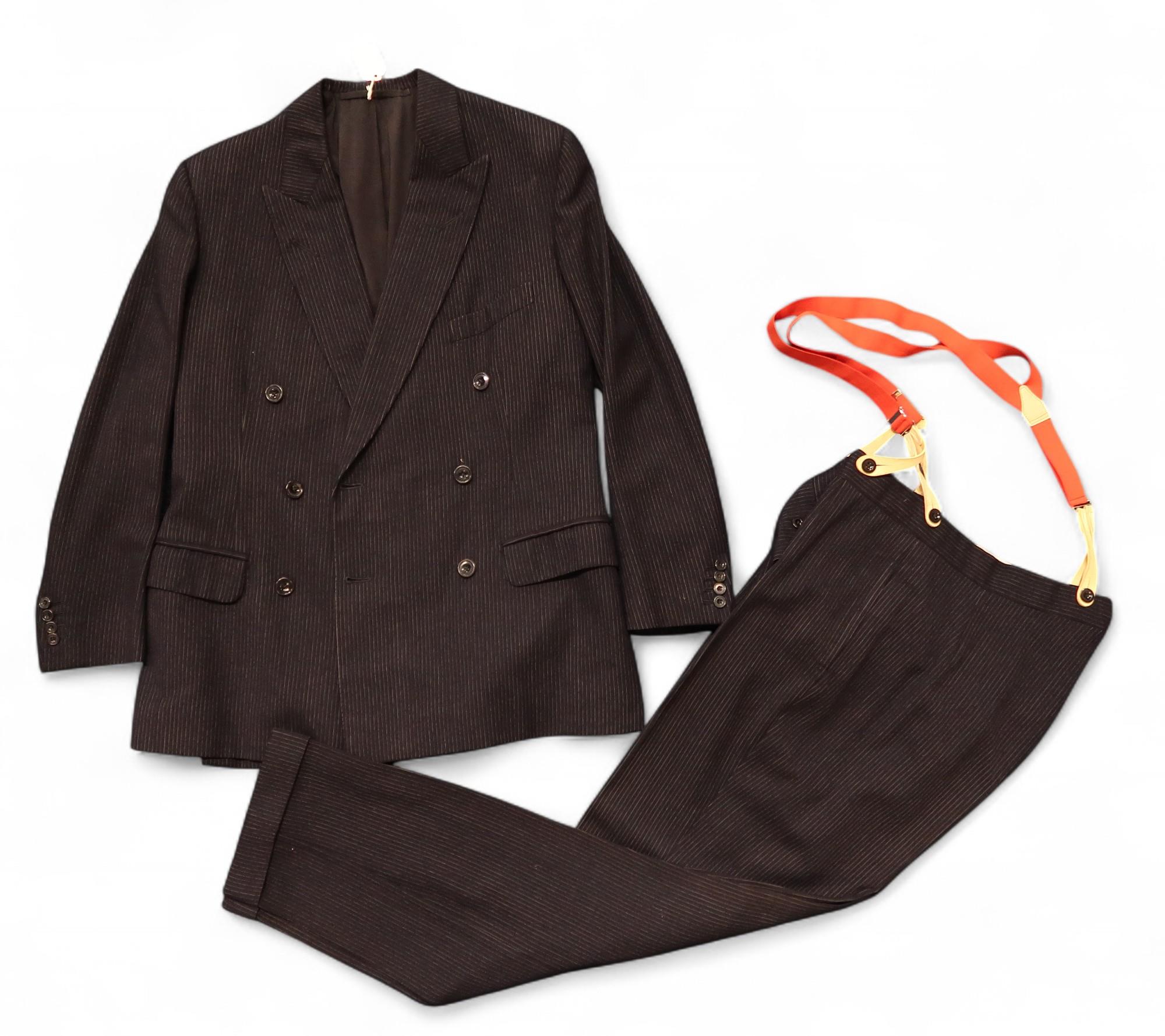A navy pinstripe double-breasted two-piece wool suit by Cooling ...
