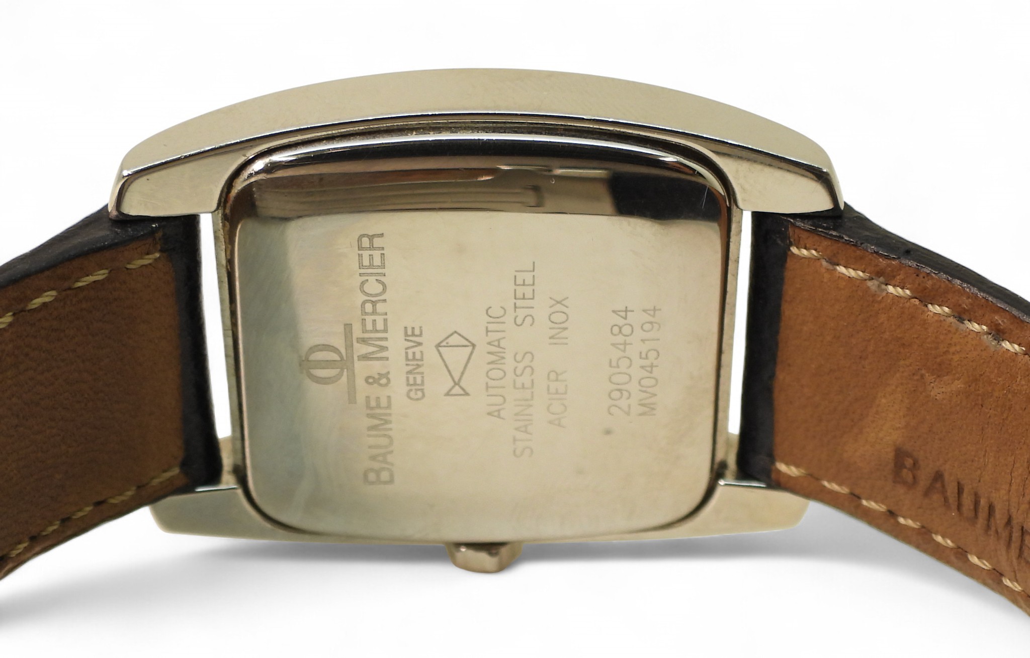 A BAUME & MERCIER AUTOMATIC with a two tone navy blue dial with ...