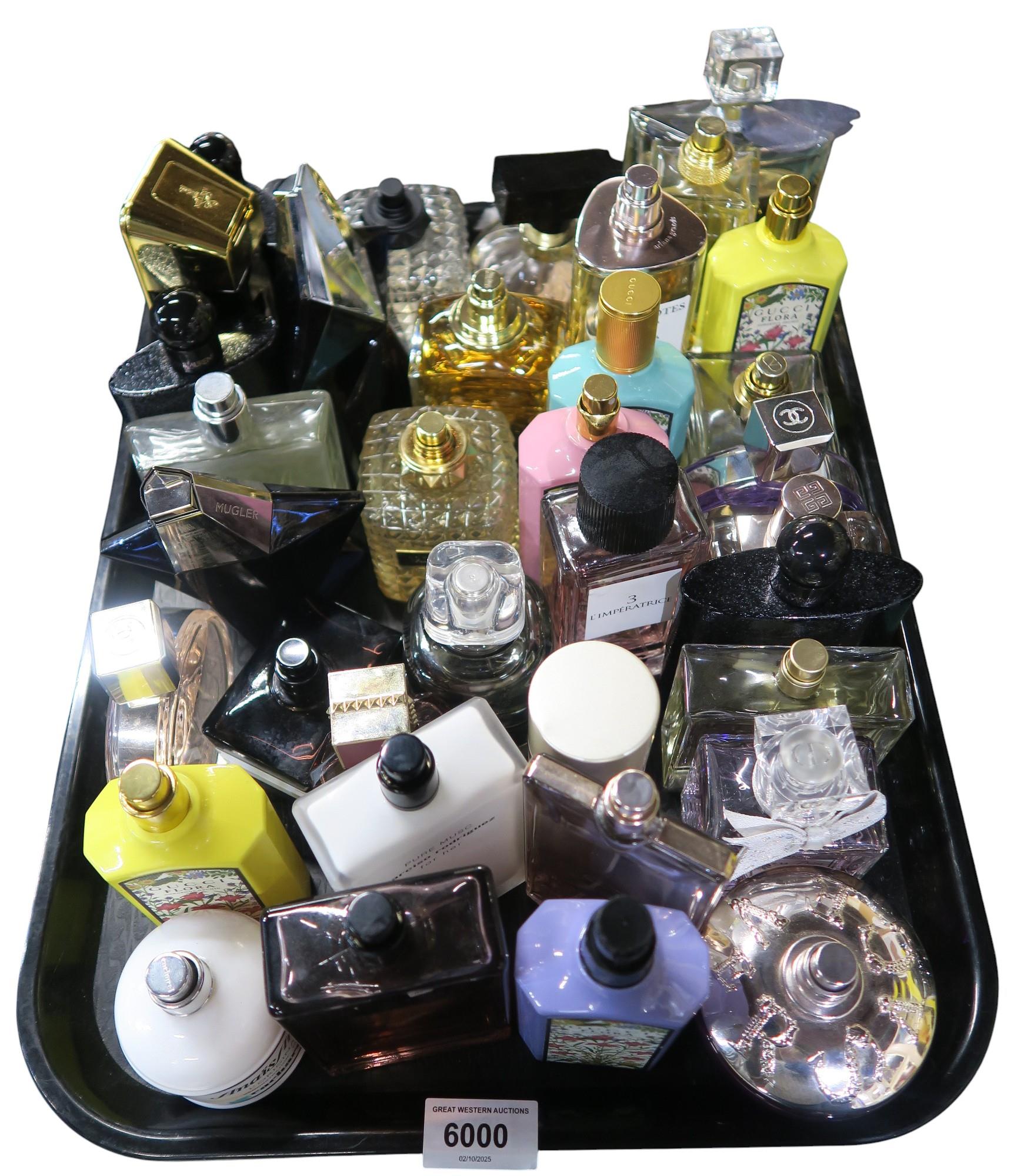 A collection of mainly ladies perfume, mostly testers including Miss ...