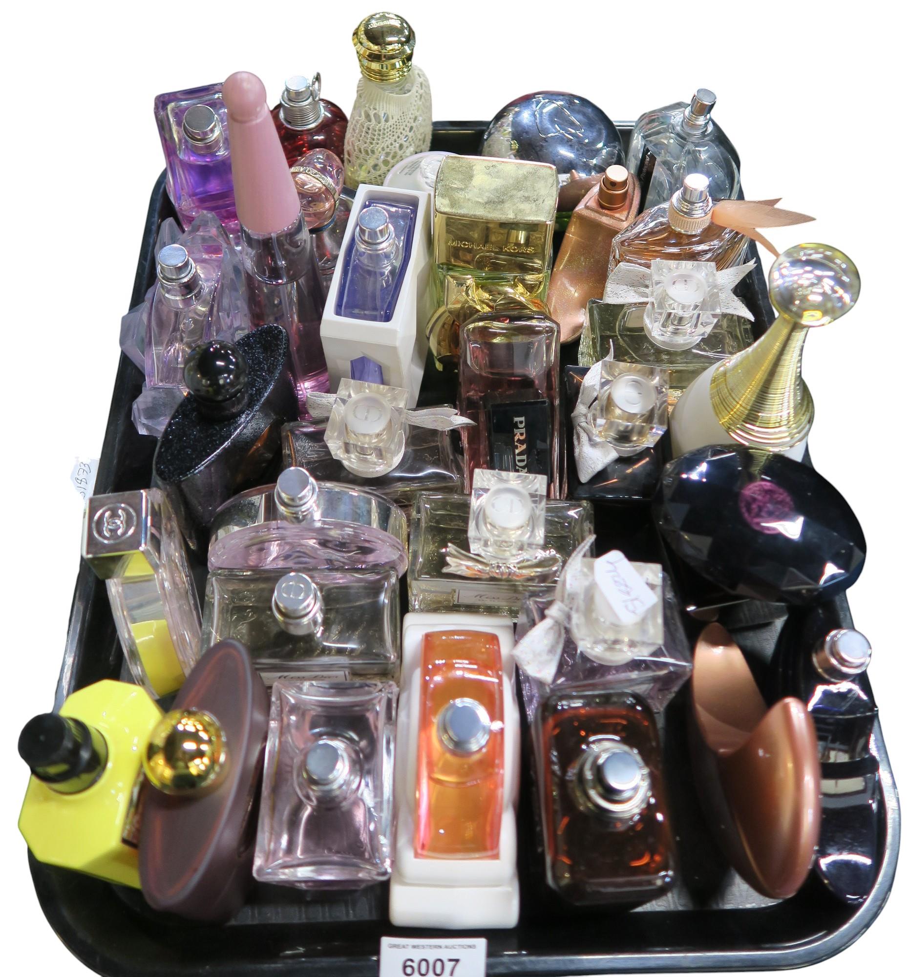 A collection of mainly ladies perfume, mostly testers including Gucci ...