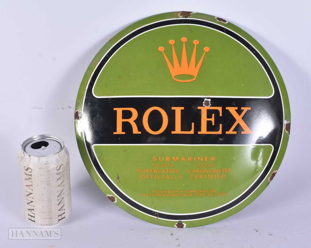 A ROLEX SUBMARINER ENAMEL SIGN. 29 cm wide.