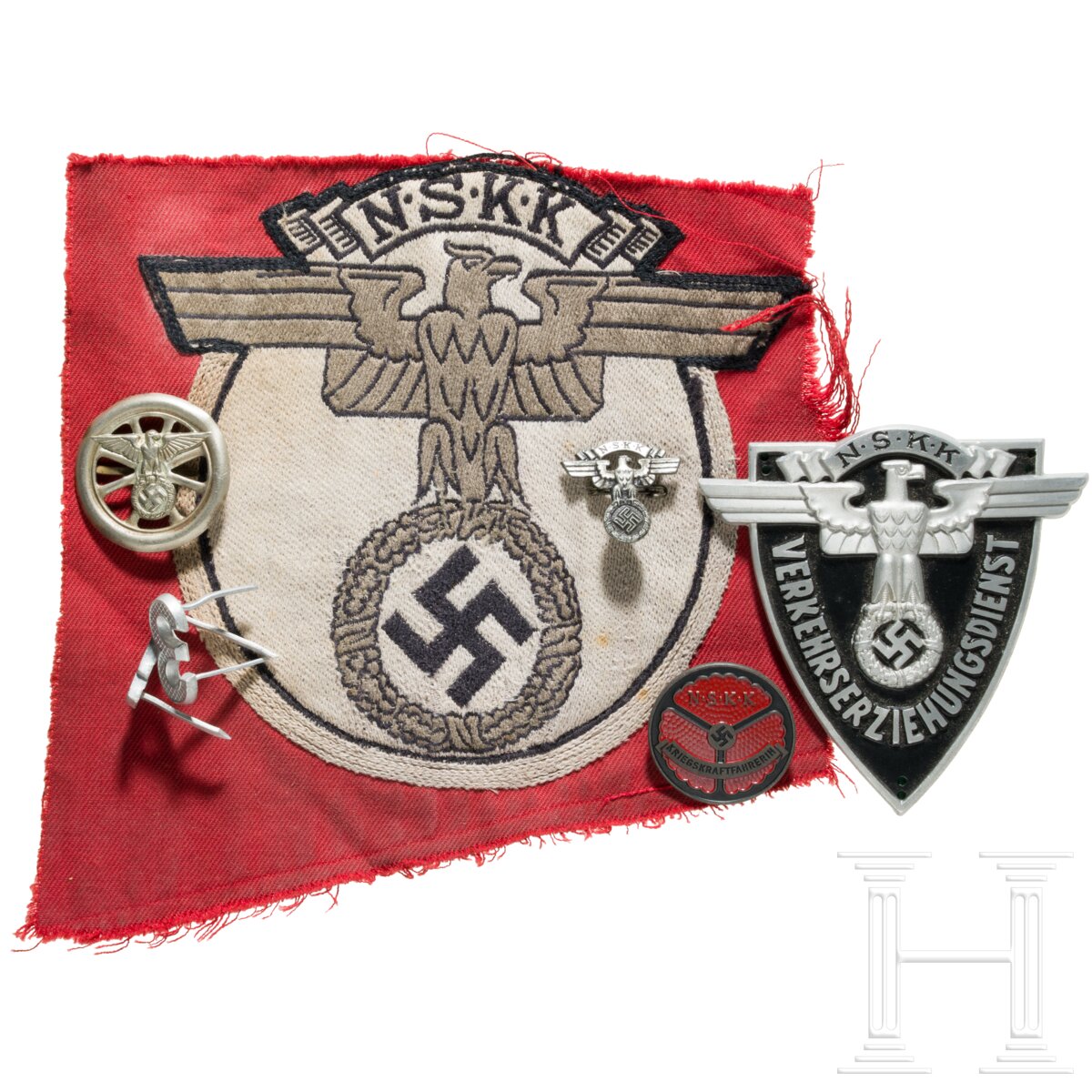 A small group of NSKK insignia Ärmelschild aus schwarz lackierten ...