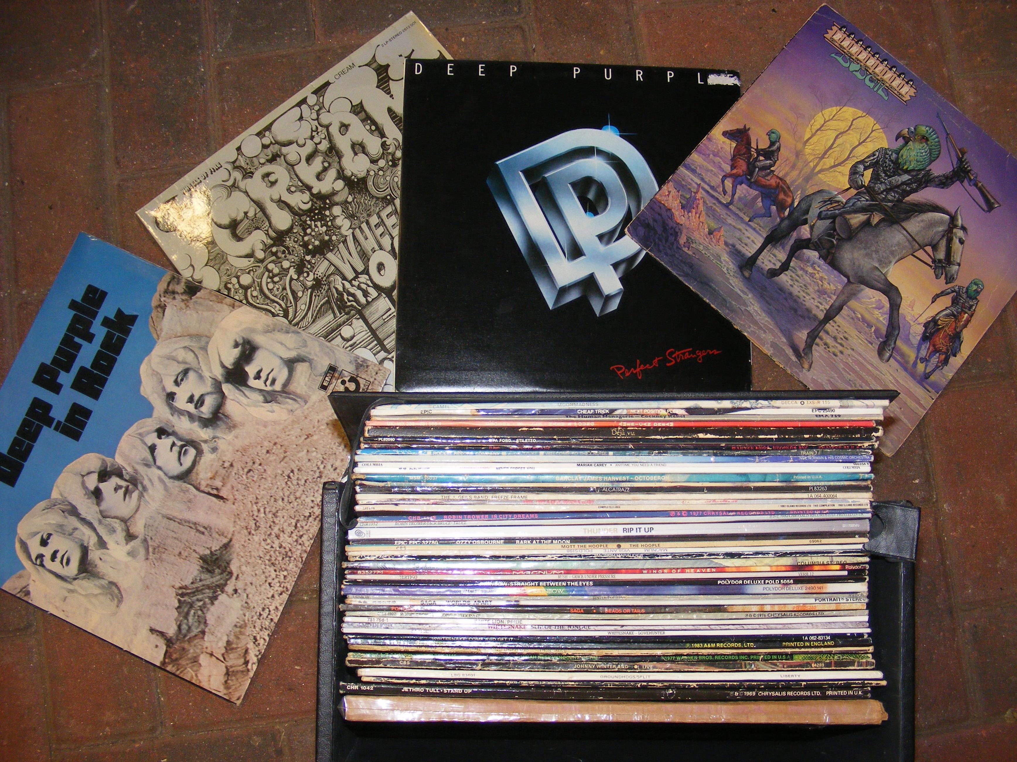 A collection of vinyl LP records in carry case