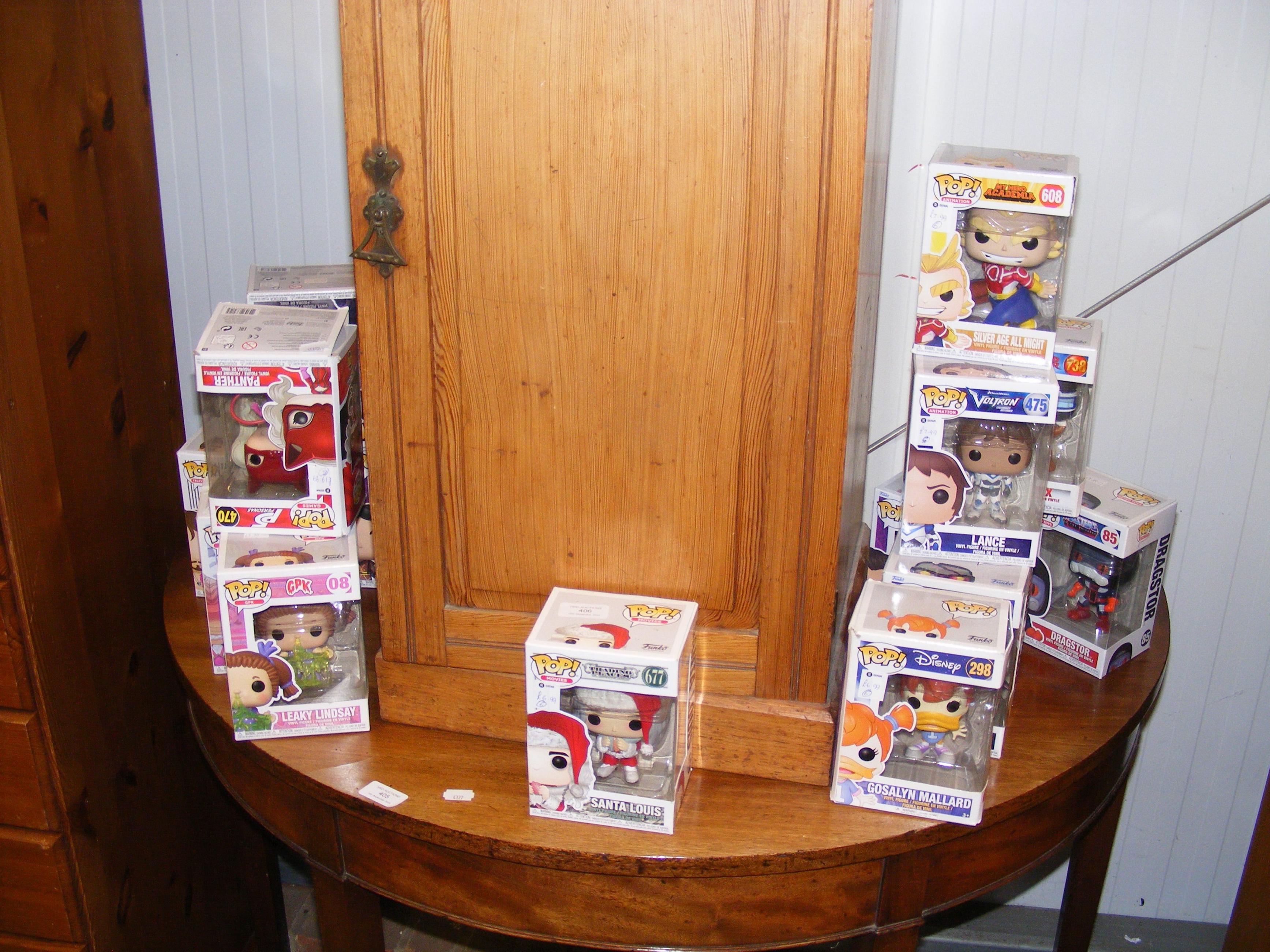 A collection of Funko Pop! figures, including 'Leaky Lindsay'