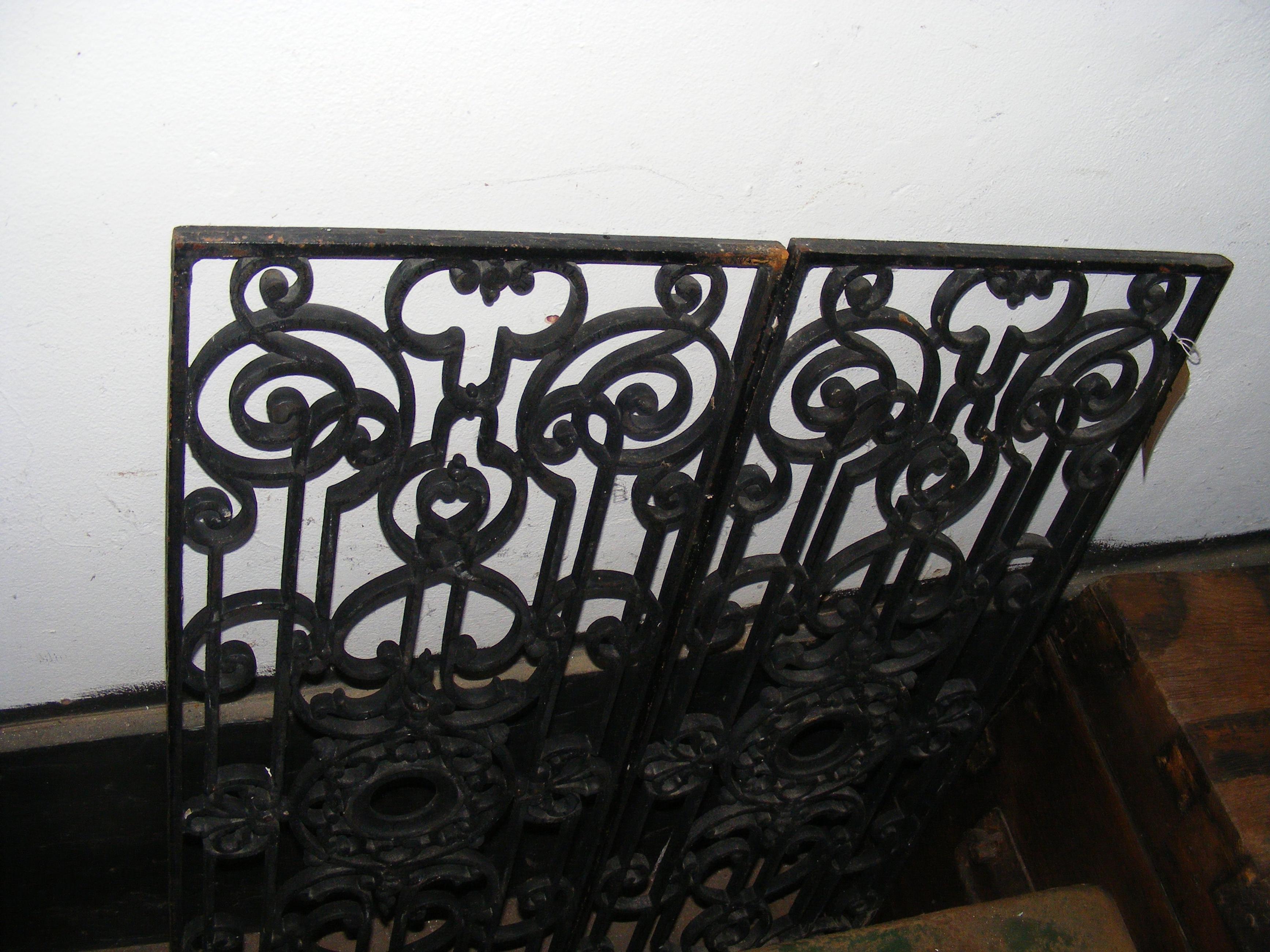 A pair of wrought iron rectangular panels