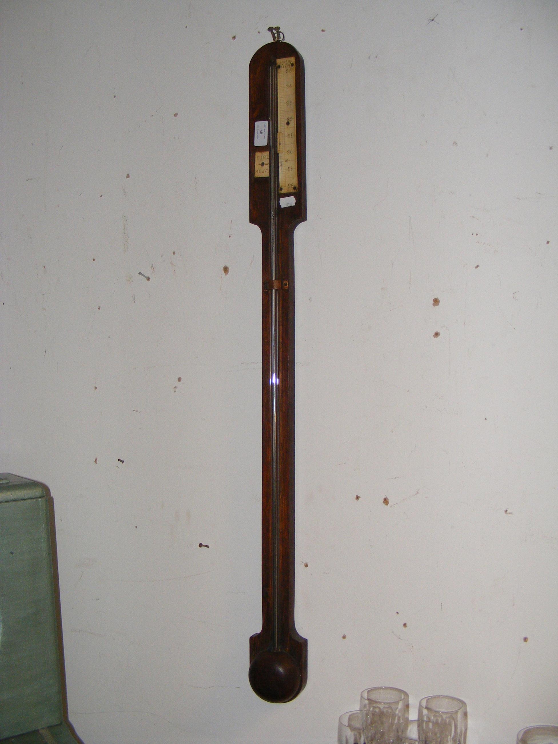 An antique stick barometer