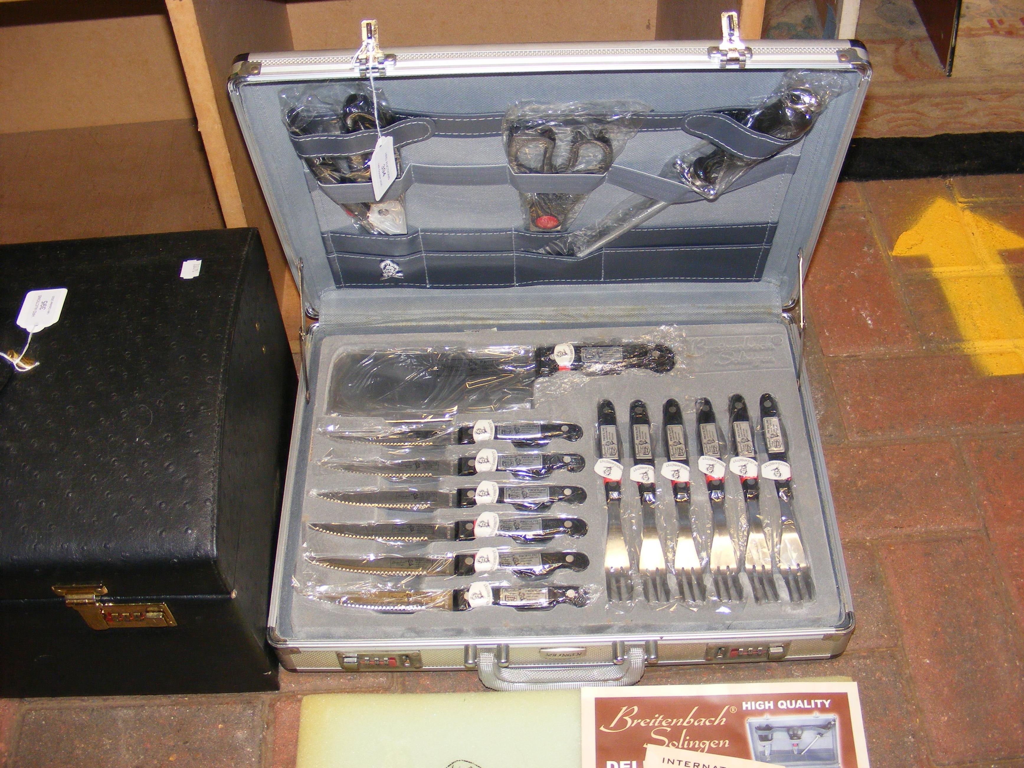 A Breitenbach Solingen 24 piece Deluxe Knife Set - in case