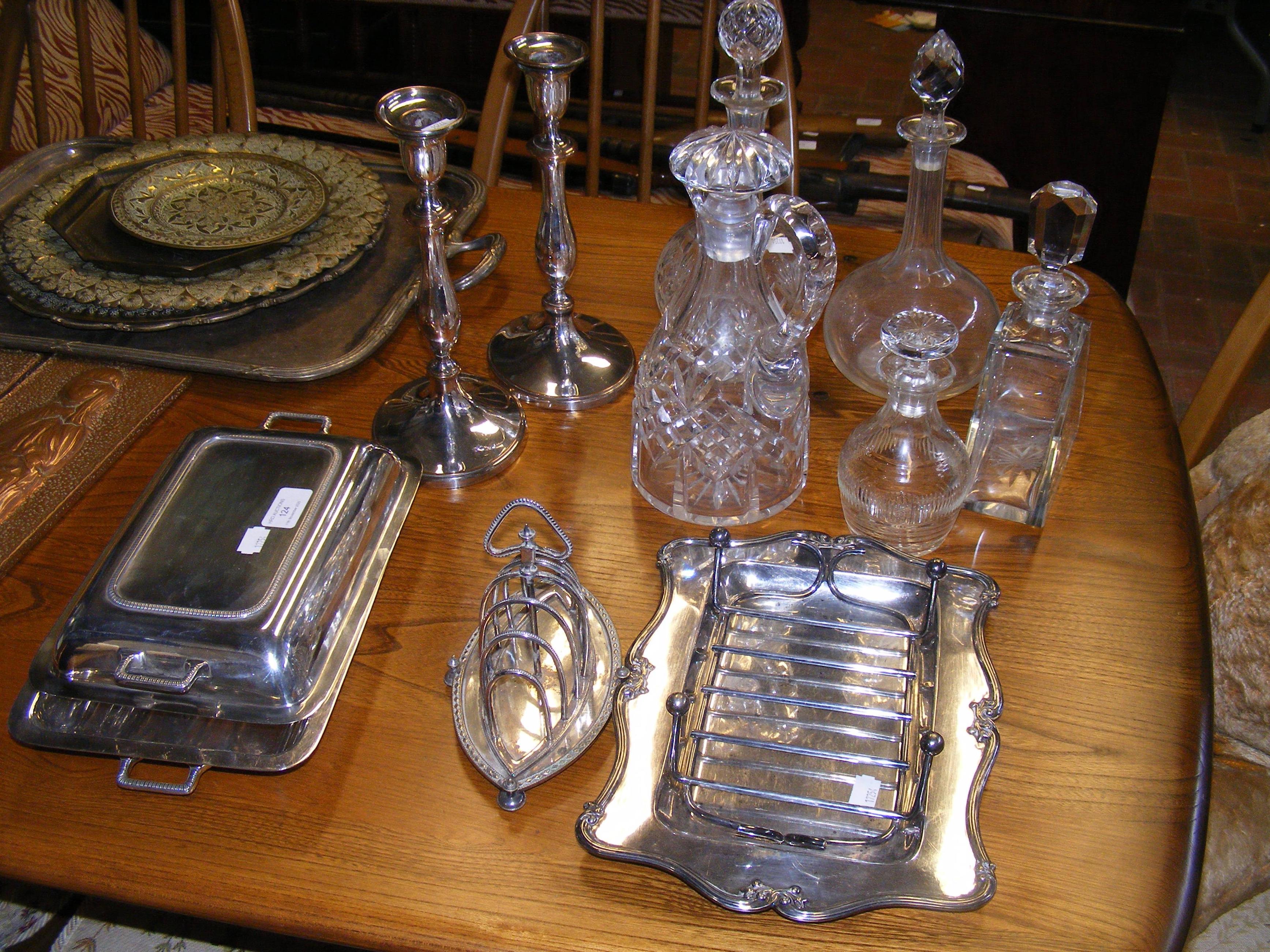 A selection of silver plated ware and cut glass decanters