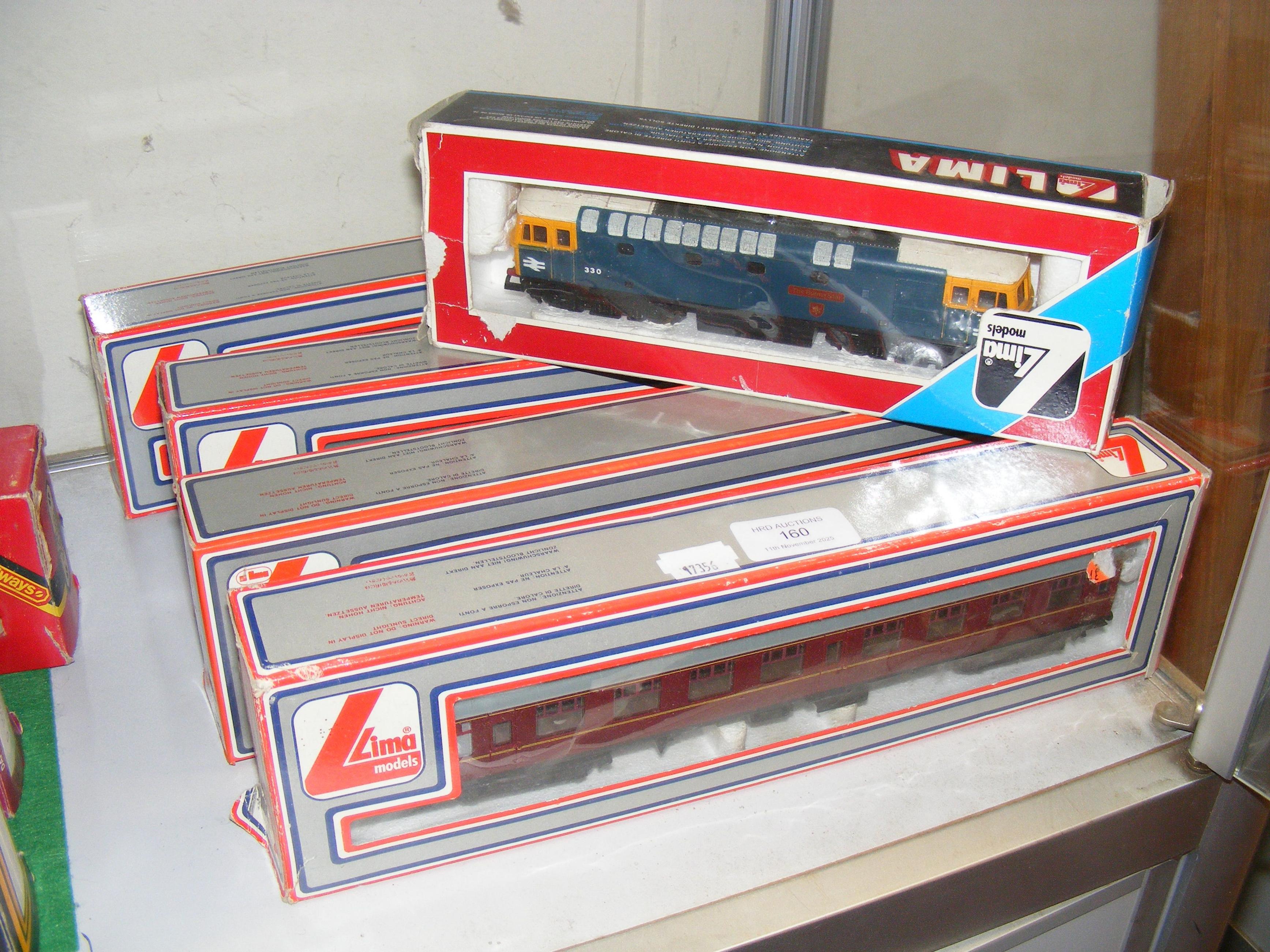 A boxed Lima diesel electric, together with four coaches
