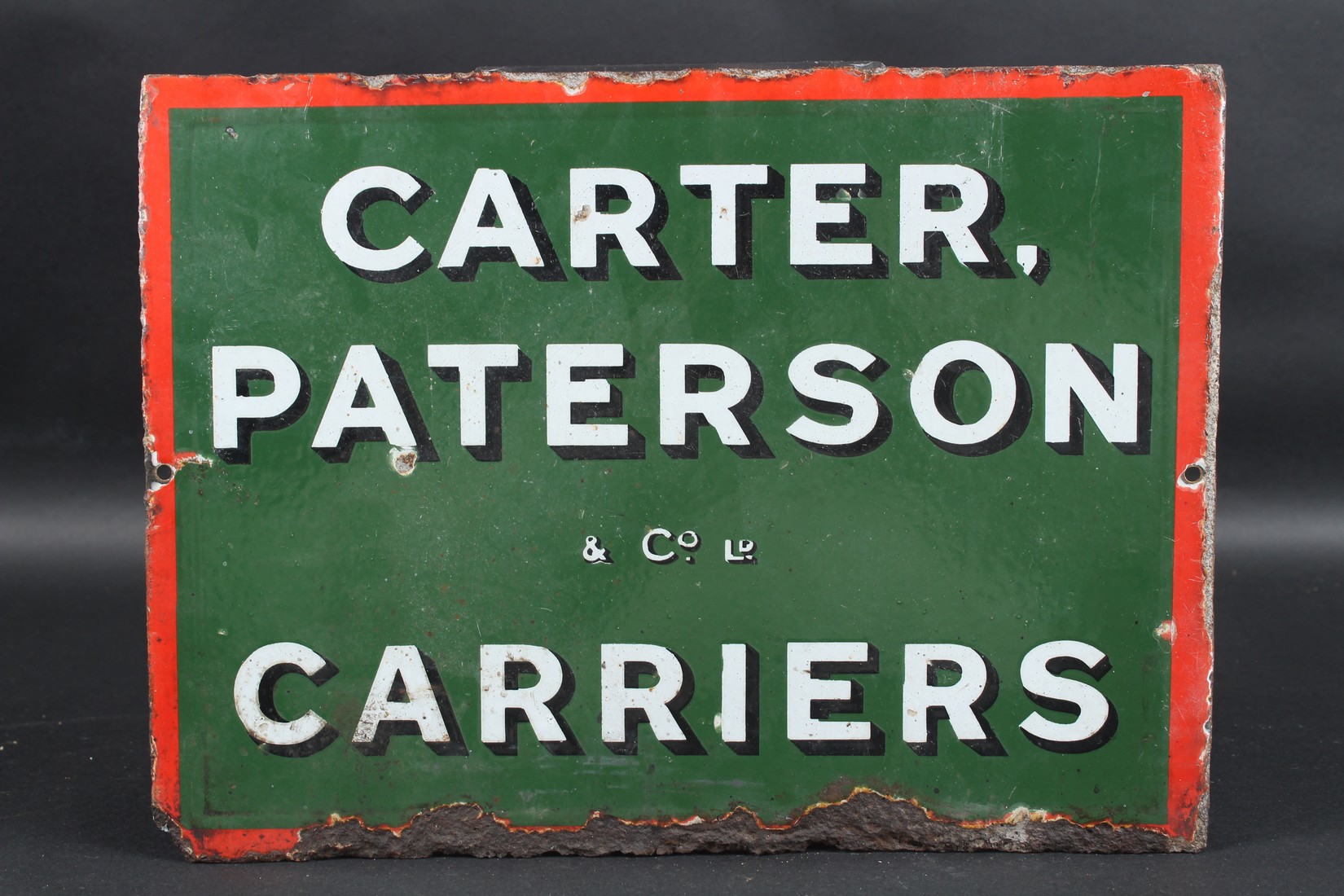 A 1930'S ENAMEL DOUBLE-SIDED ADVERTISING SIGN FOR CARTER, PATERSON & CO ...
