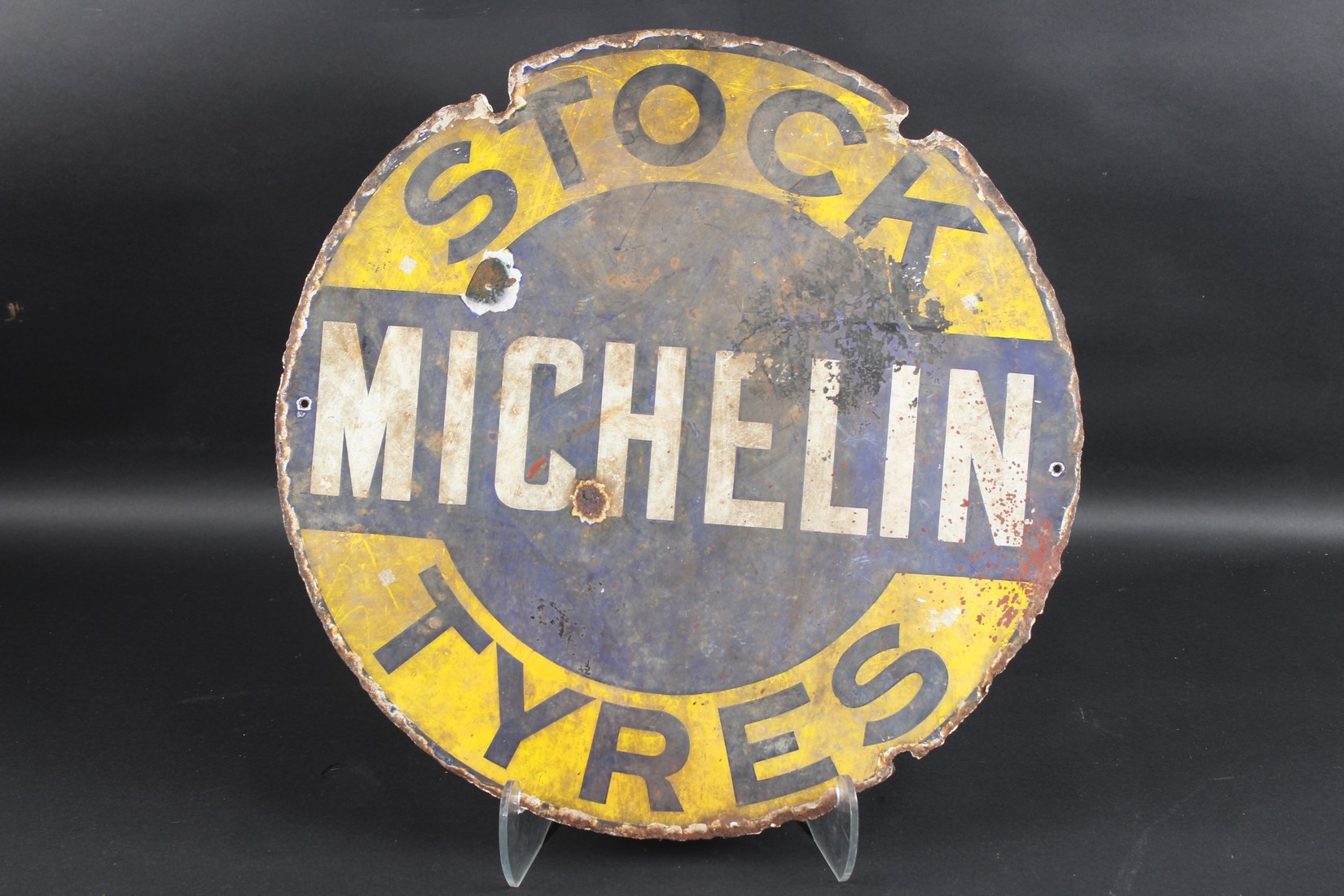 A VINTAGE DOUBLESIDED MICHELIN CIRCULAR ADVERTISING SIGN in blue and ...