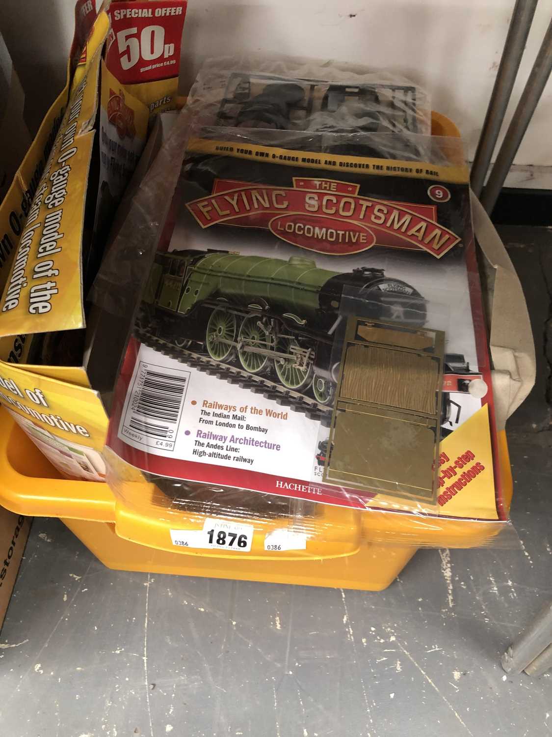 A box of Flying Scotsman kit form pieces in weekly issued bags