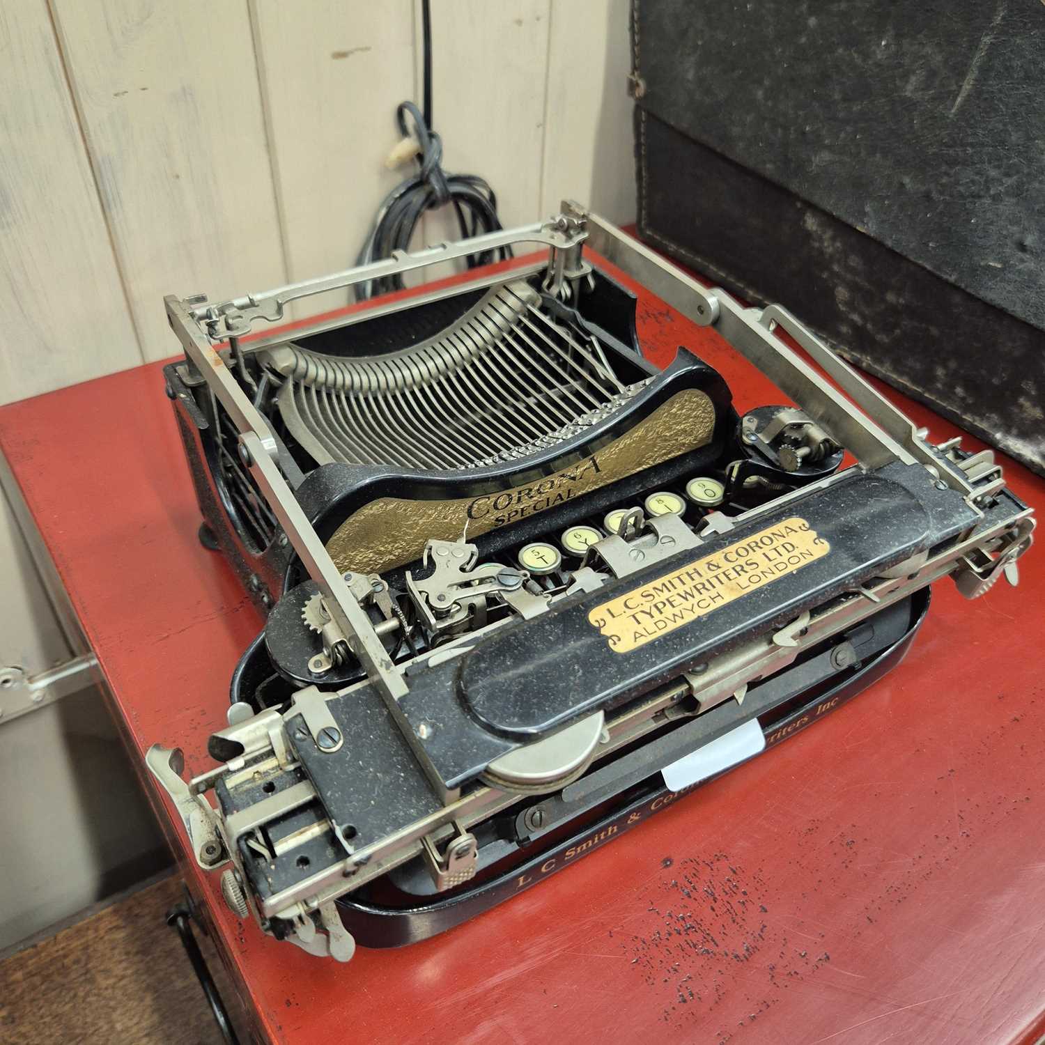 A rare L.C. Smith Corona special folding typewriter.