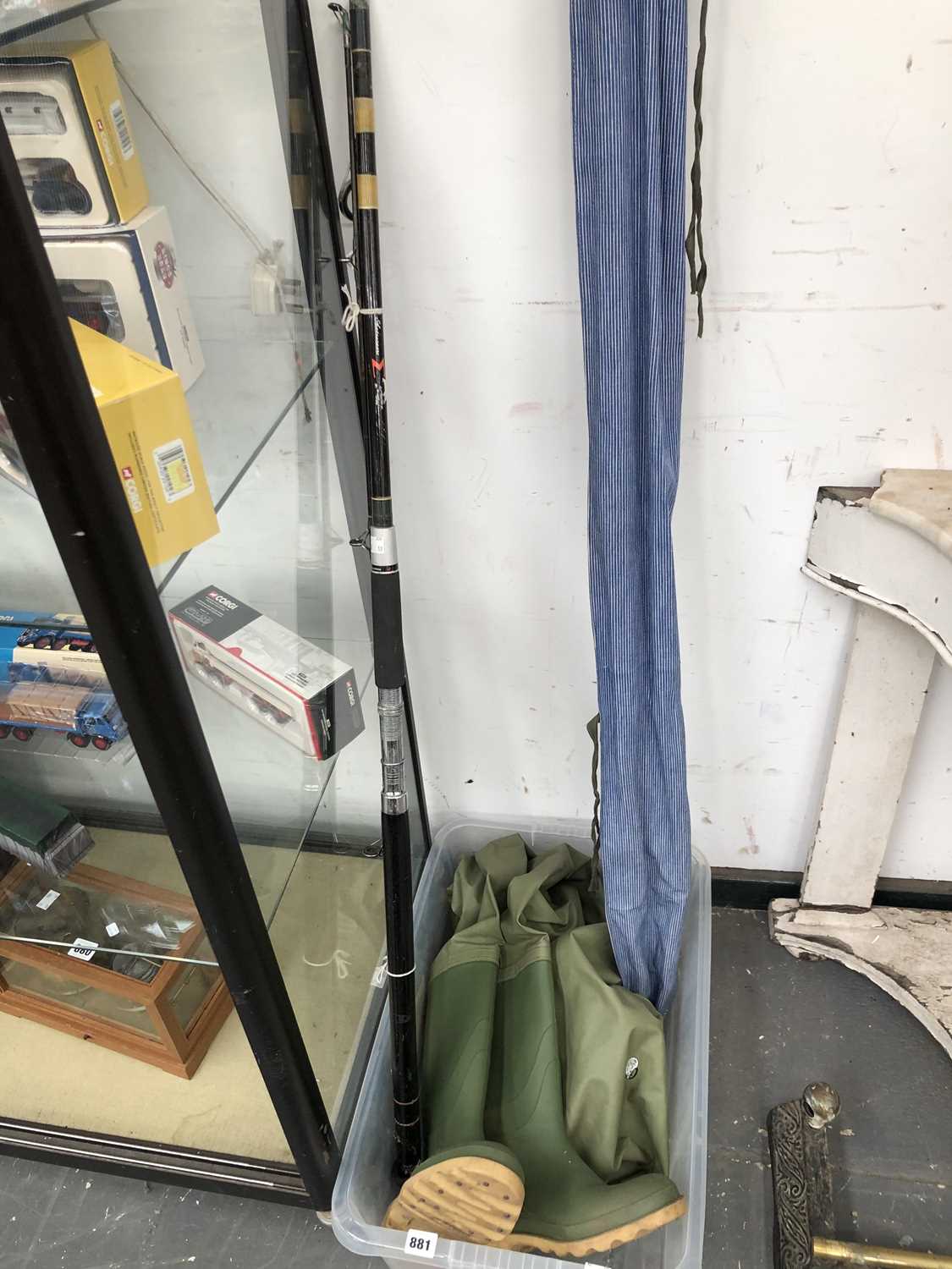 A pair of waders together with Shakespeare and Vortex Valiant fishing rods