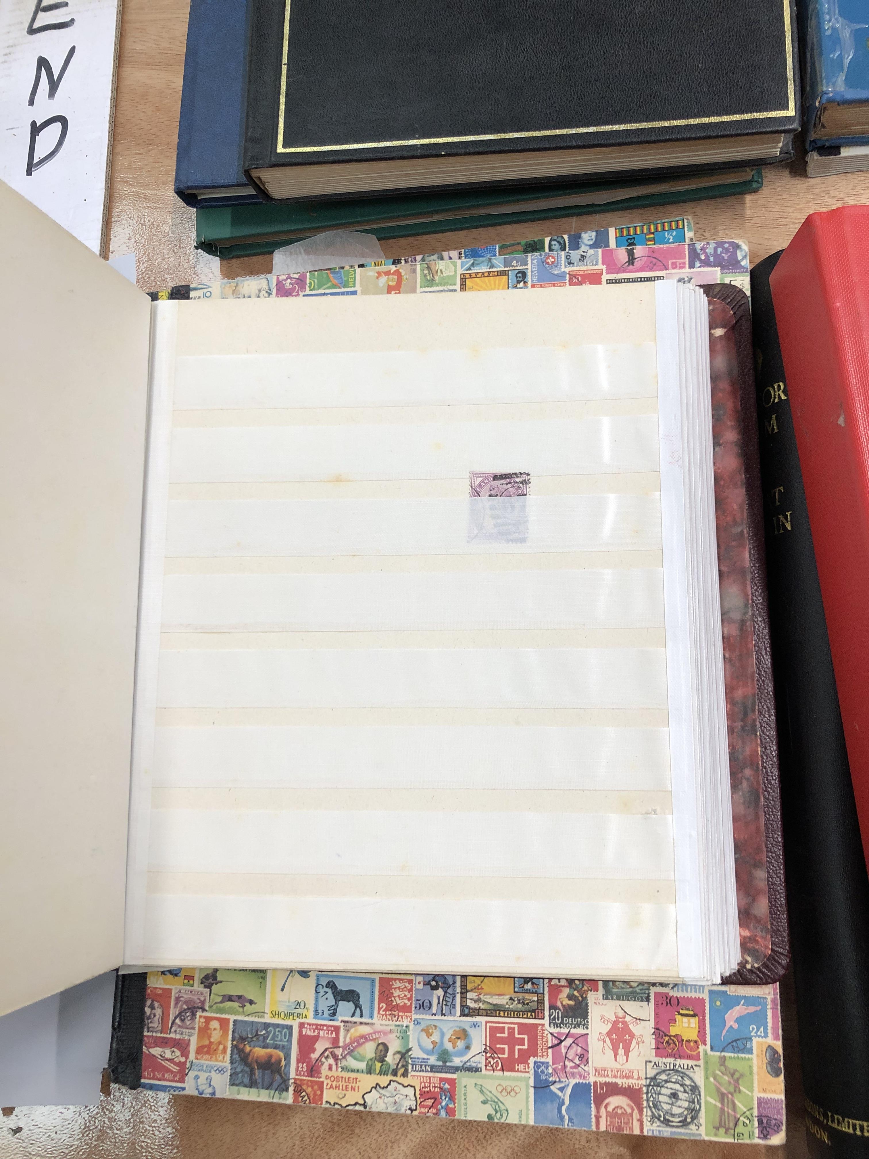 Ten various stamp albums