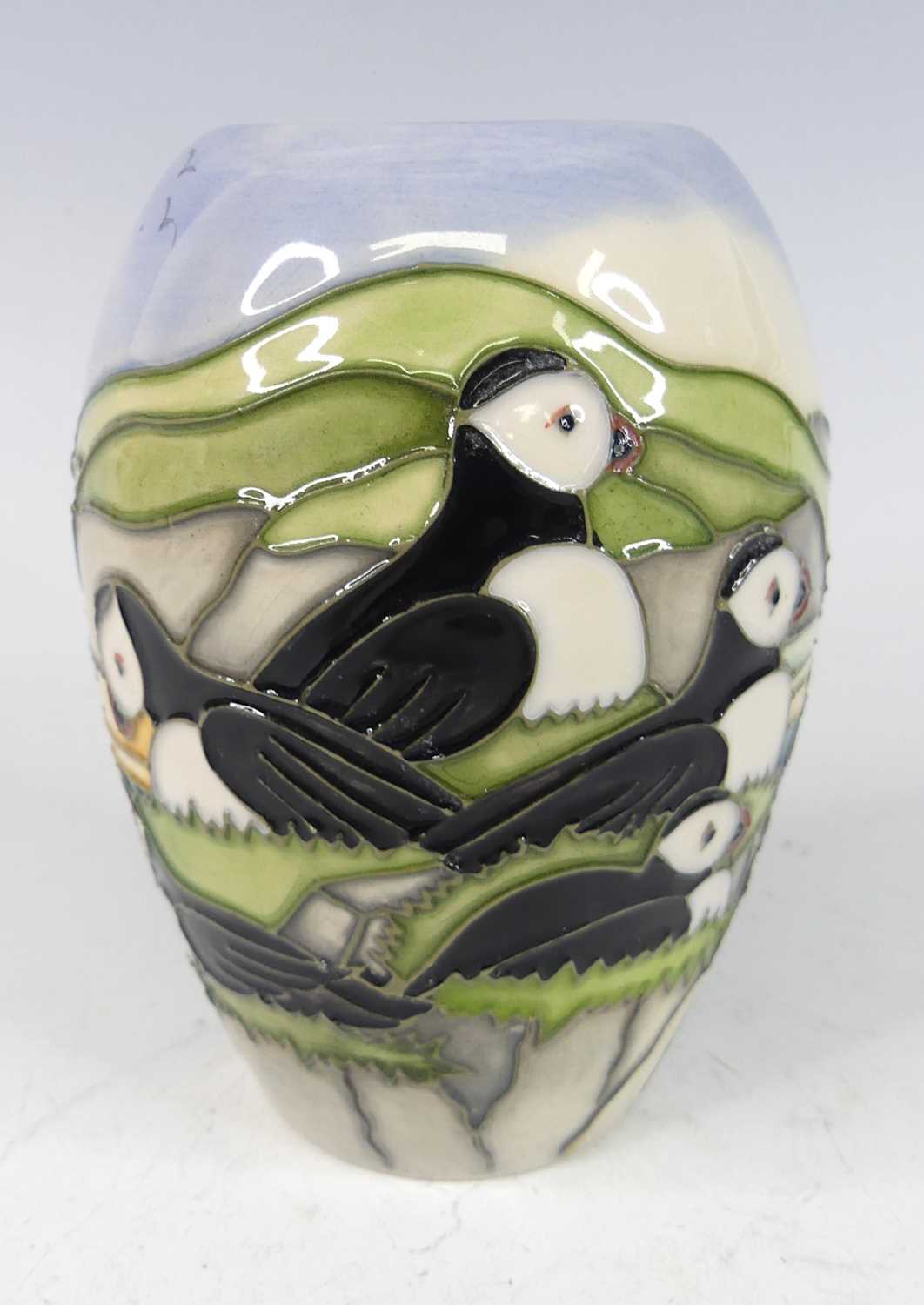 A contemporary Moorcroft 'Puffin' pattern pottery vase, designed by ...