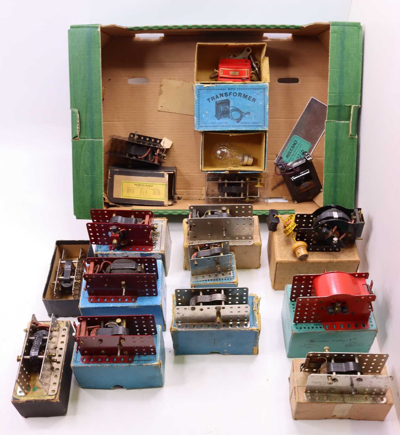 One tray containing various Meccano electricals to include an M212 ...