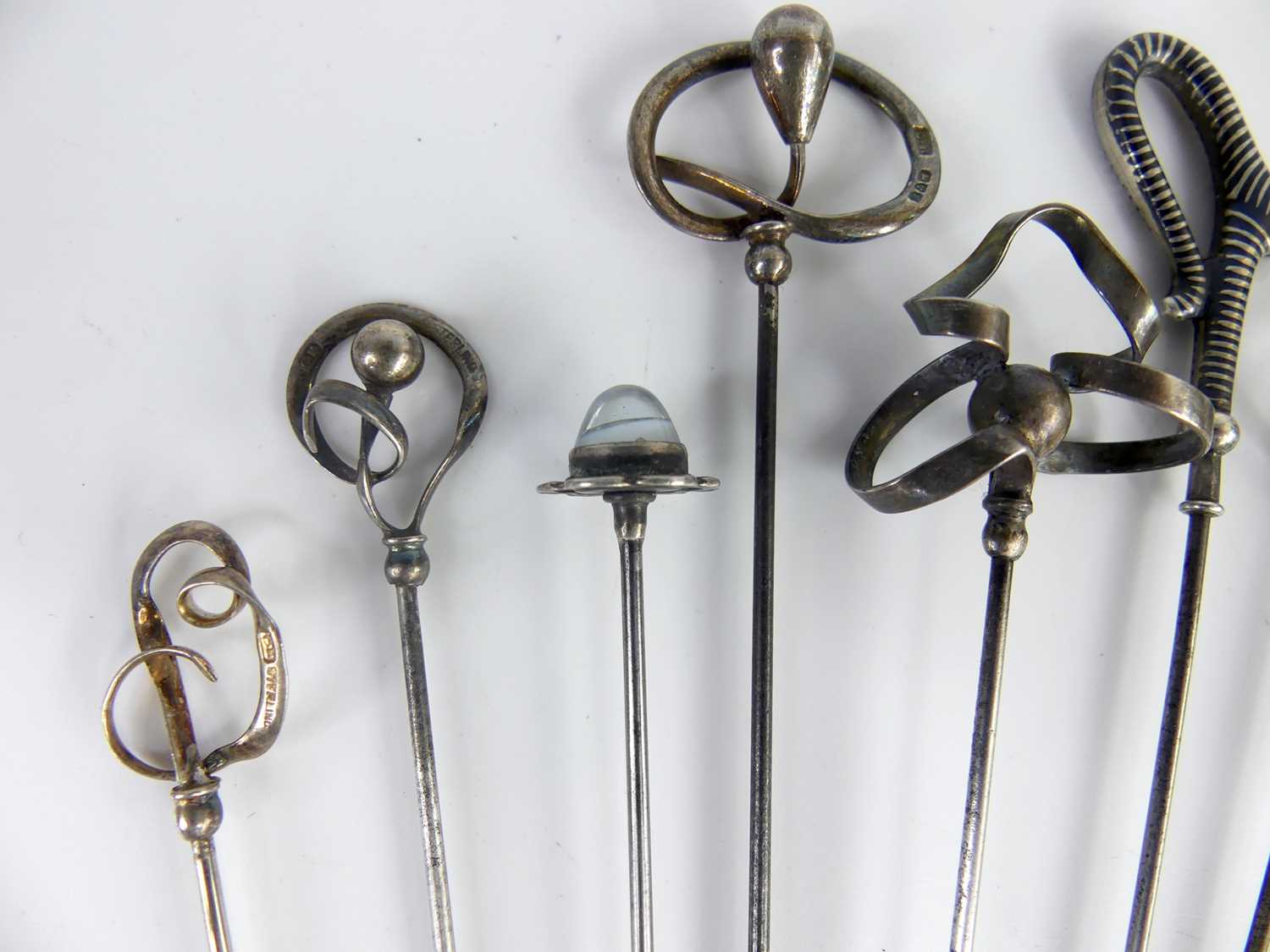 A collection of ten various Charles Horner silver hat pins, the longest ...