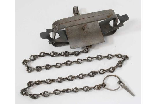 A Blake & Lamb & Co. No.3 jump trap, having 6 1/2" rounded rectangular ...