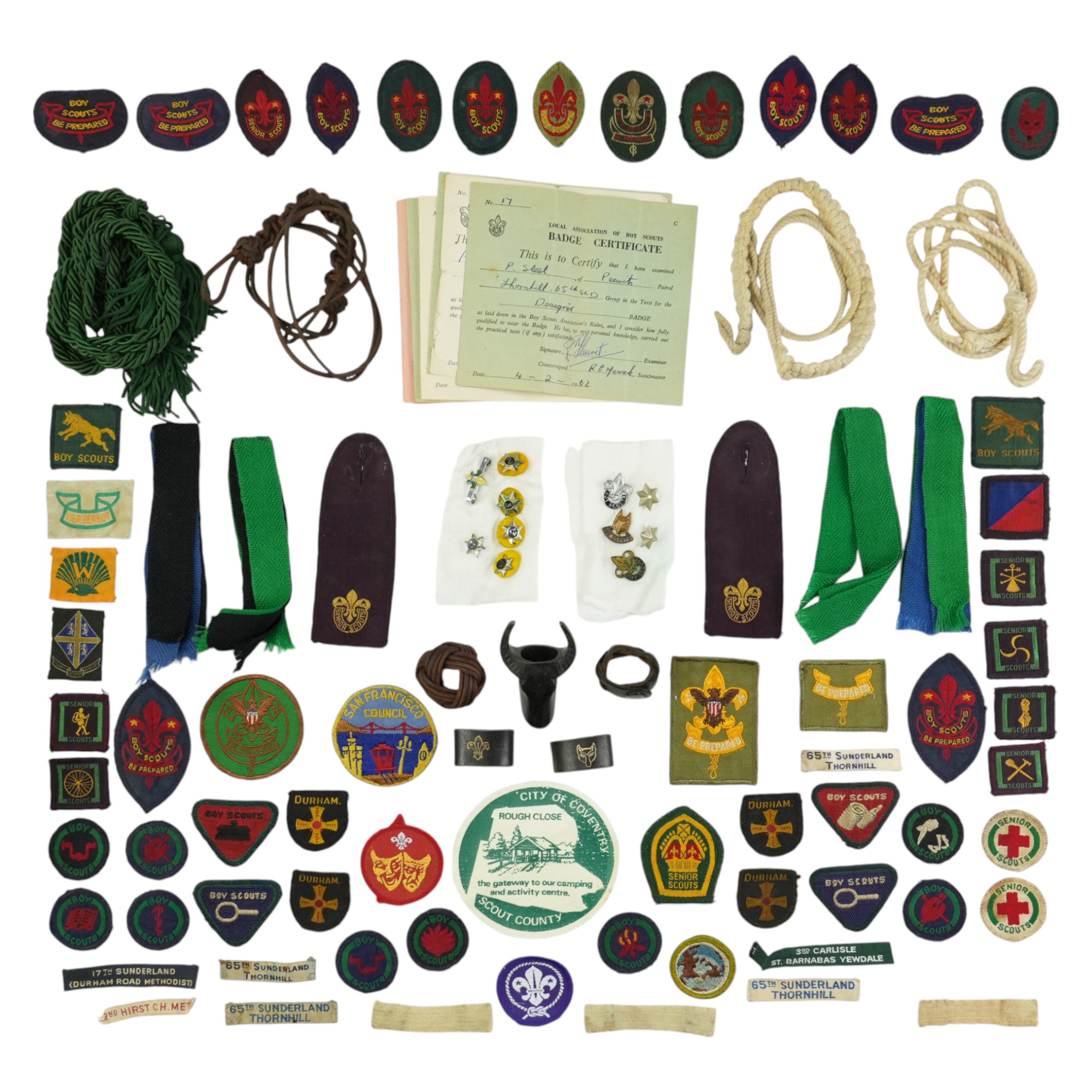 A collection of vintage Boy Scouts badges and insignia etc