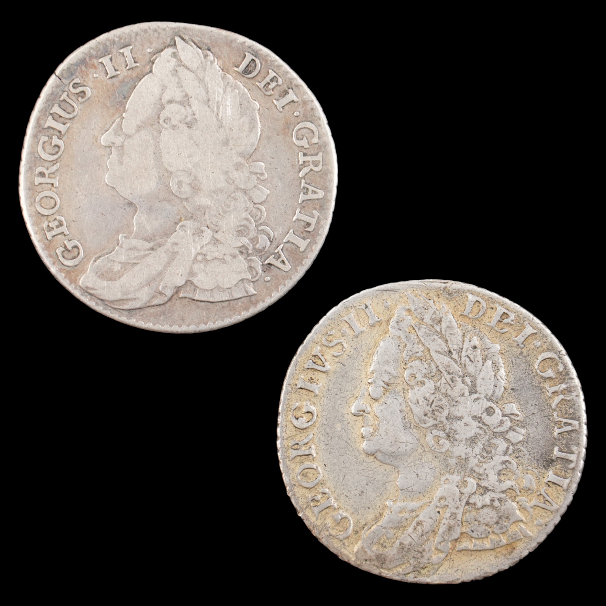 Two George II silver shilling coins, respectively dated 1743 and 1758