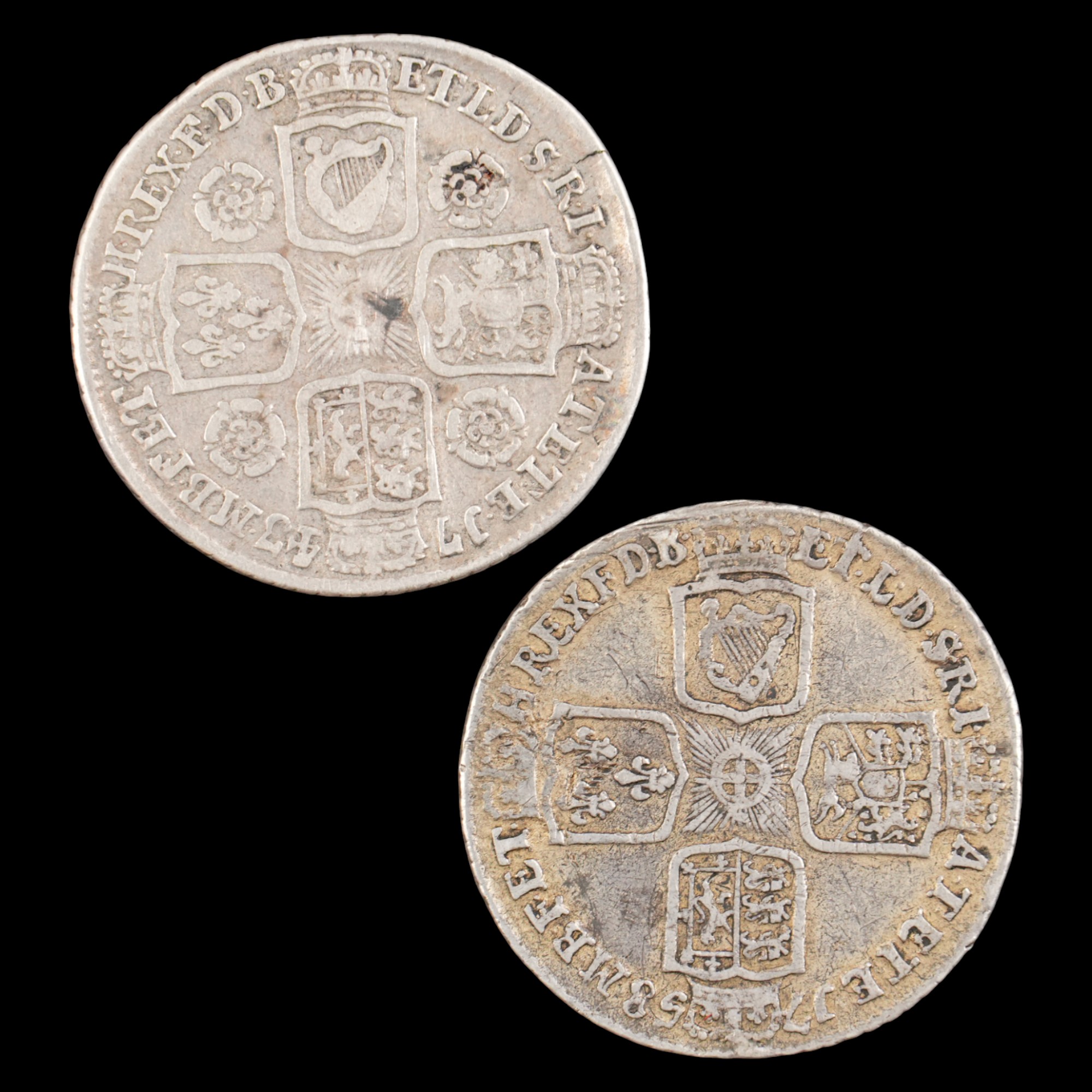 Two George II silver shilling coins, respectively dated 1743 and 1758